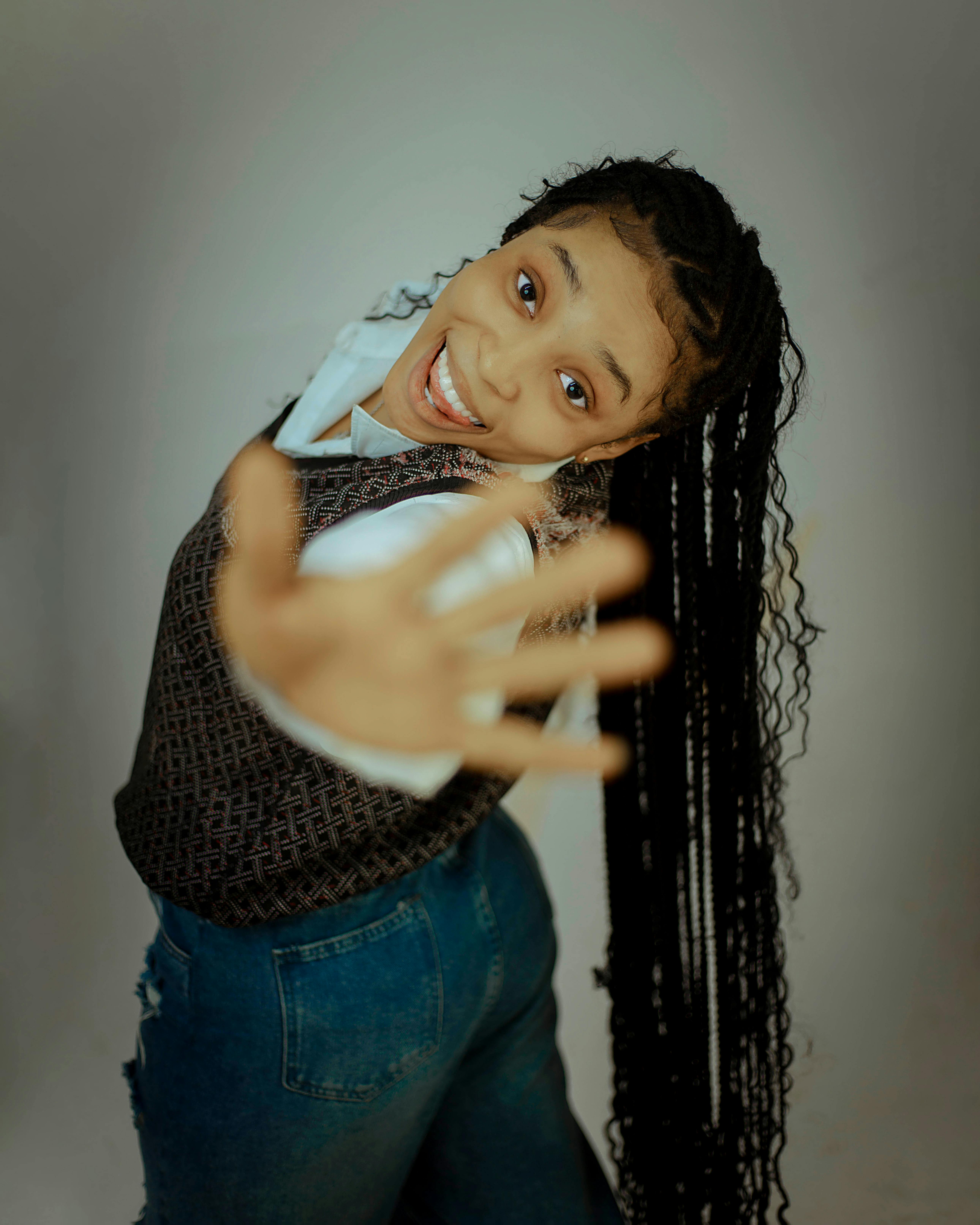 Joyful Woman Reaching Towards Camera Indoors · Free Stock Photo