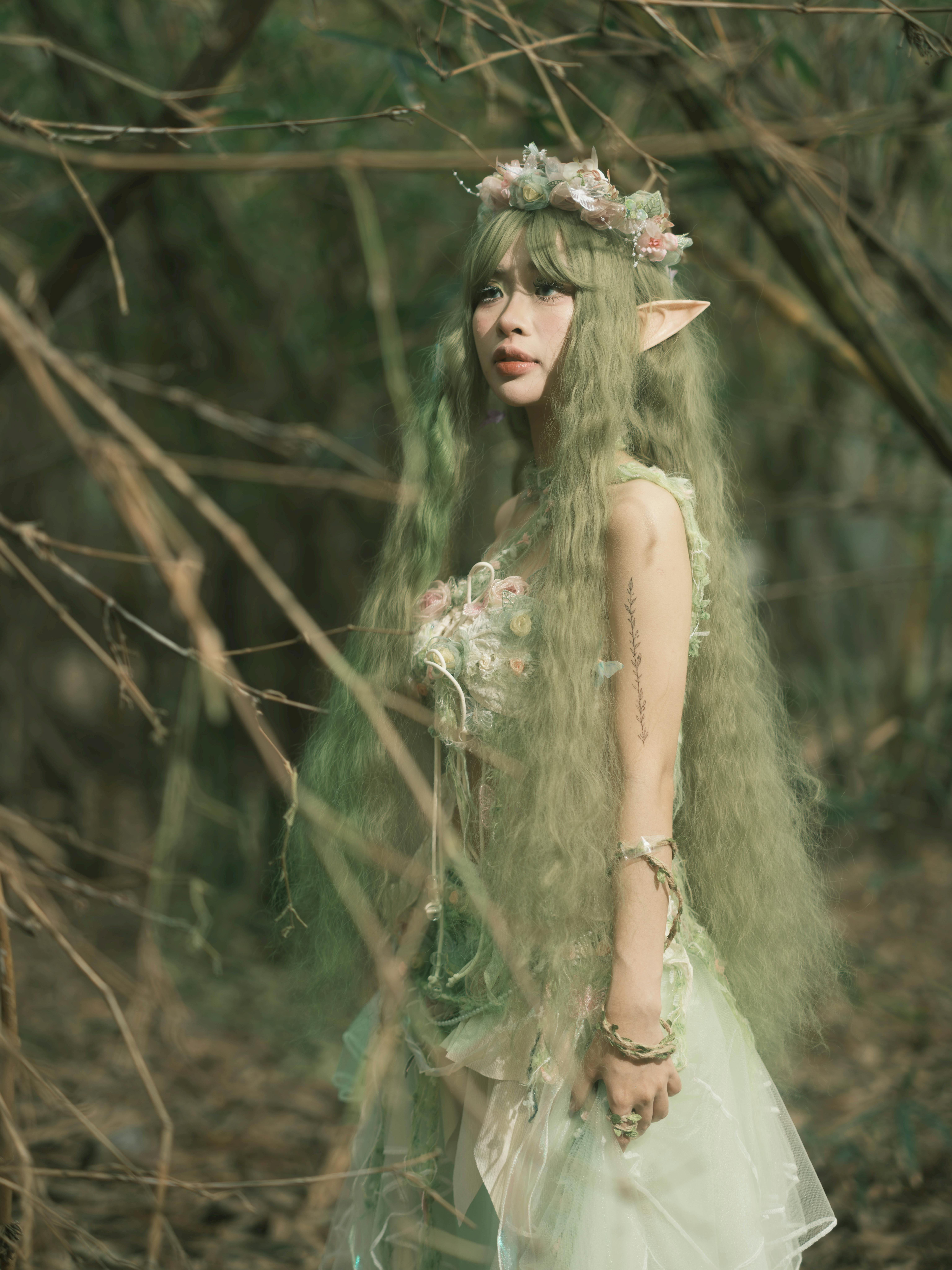 Enchanted Forest Nymph in Green Attire · Free Stock Photo