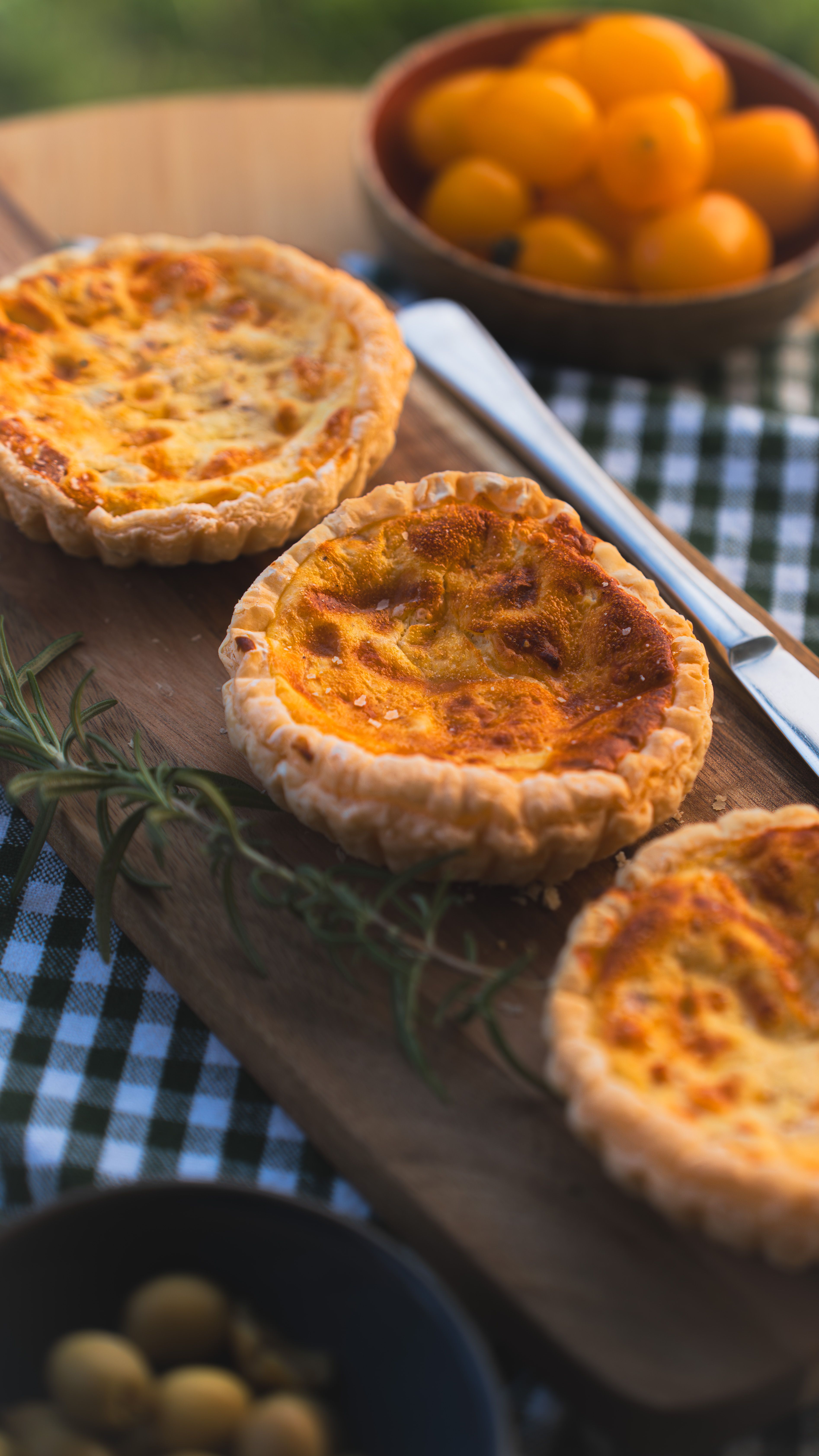 Delicious Mini Quiches on Rustic Wooden Board · Free Stock Photo