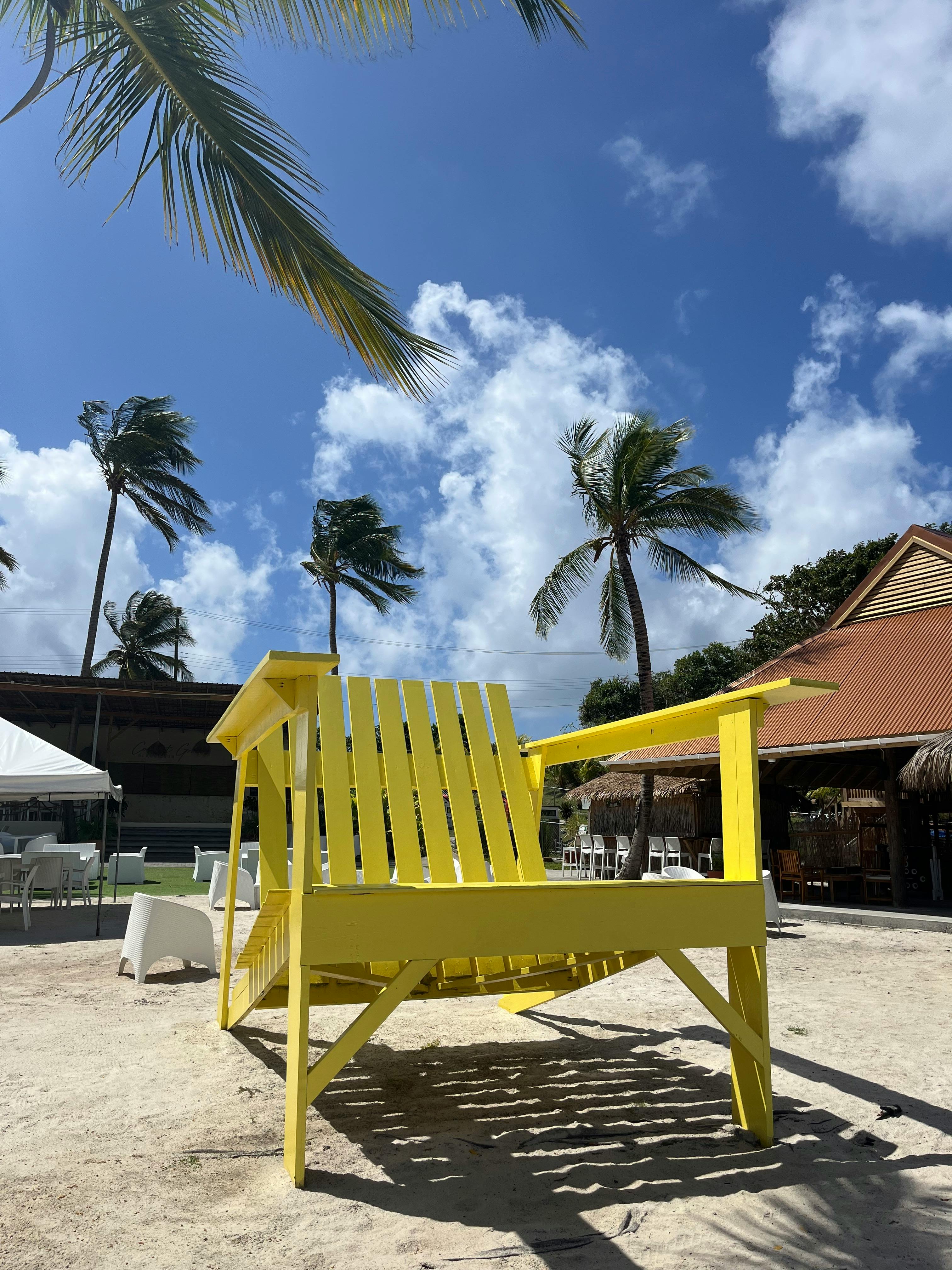 Bright Yellow Beach Chair Under Palm Trees · Free Stock Photo