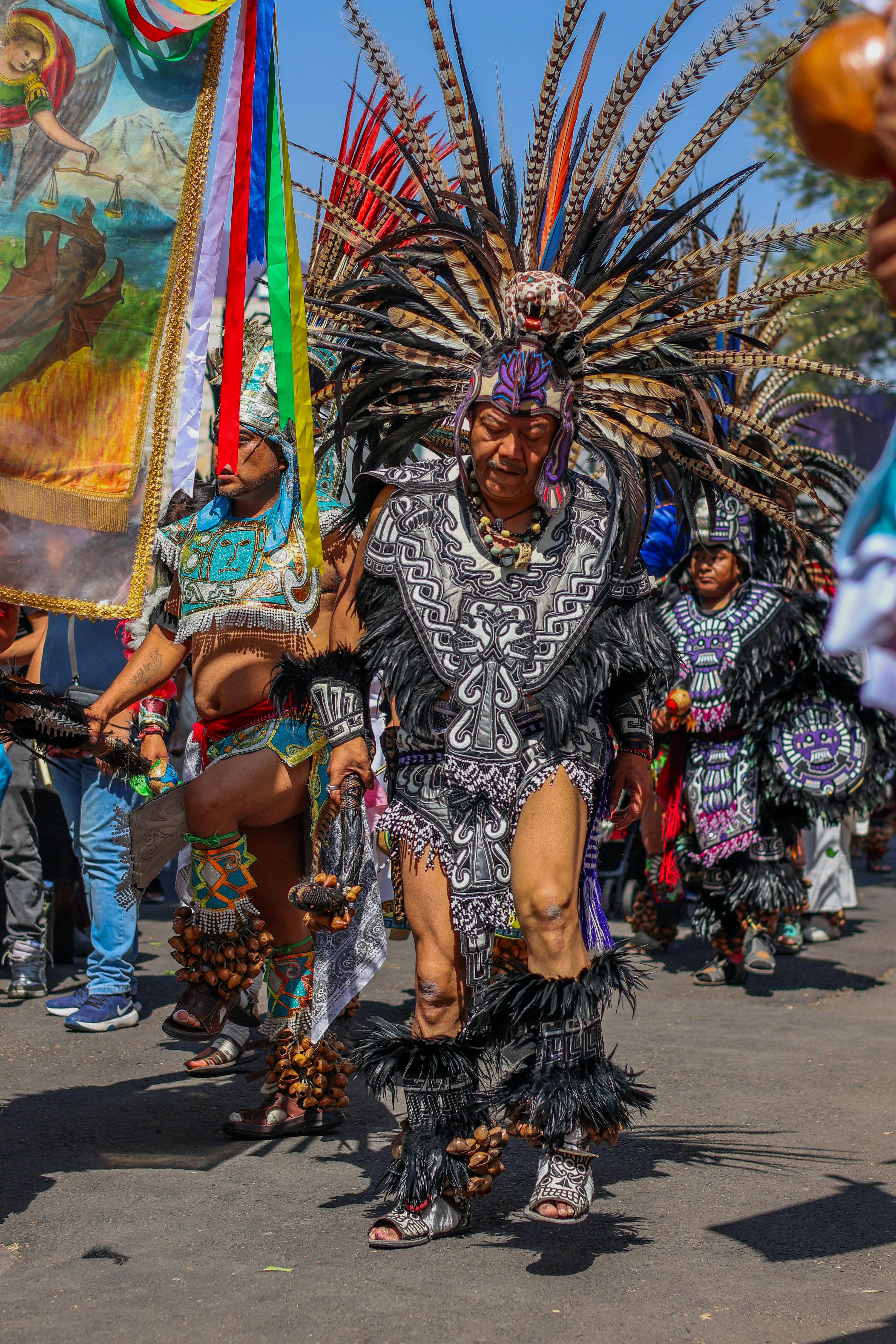 Traditional Aztec Dance in Cultural Parade · Free Stock Photo