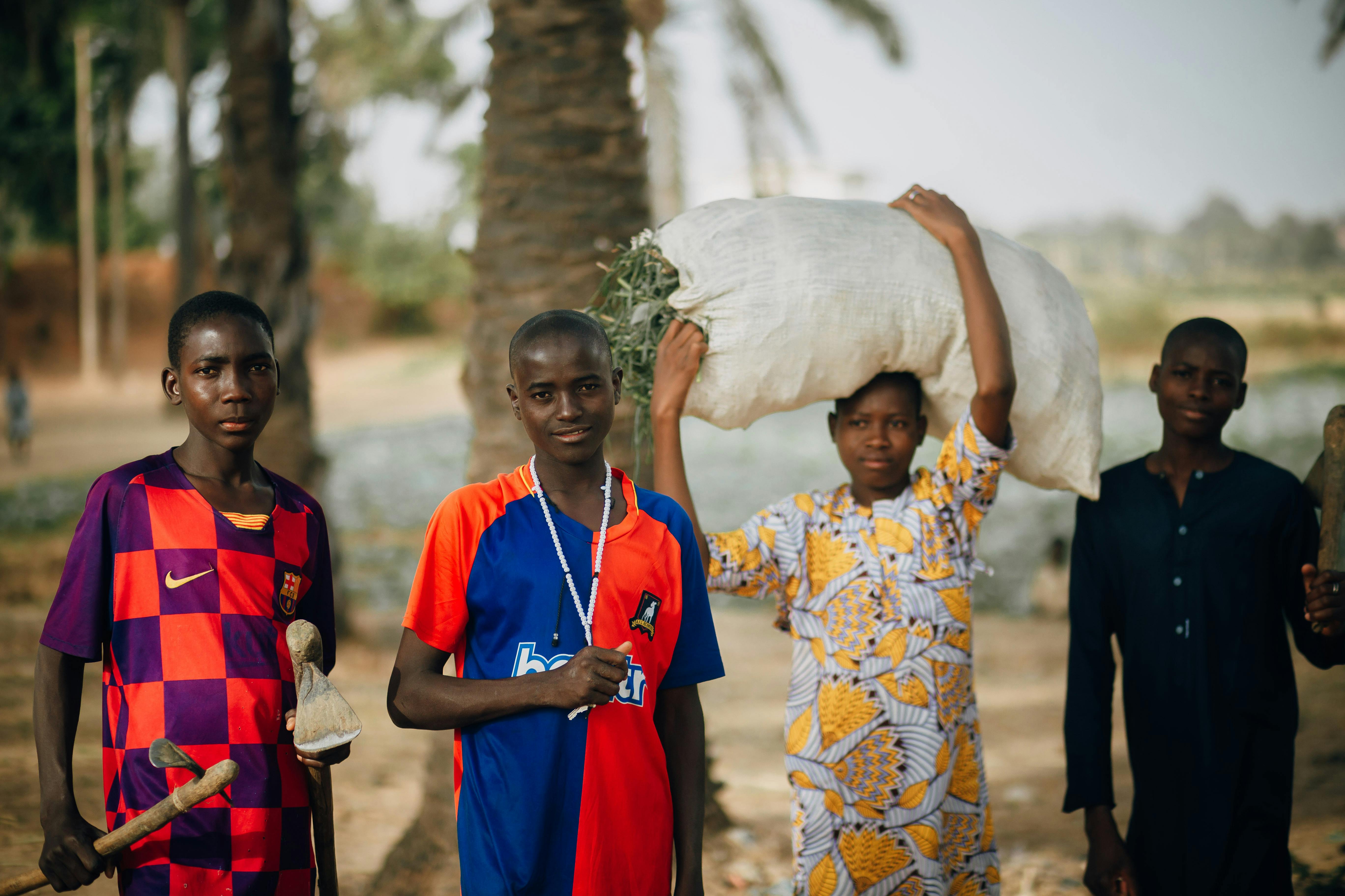 Young African Boys in Traditional and Sportswear · Free Stock Photo