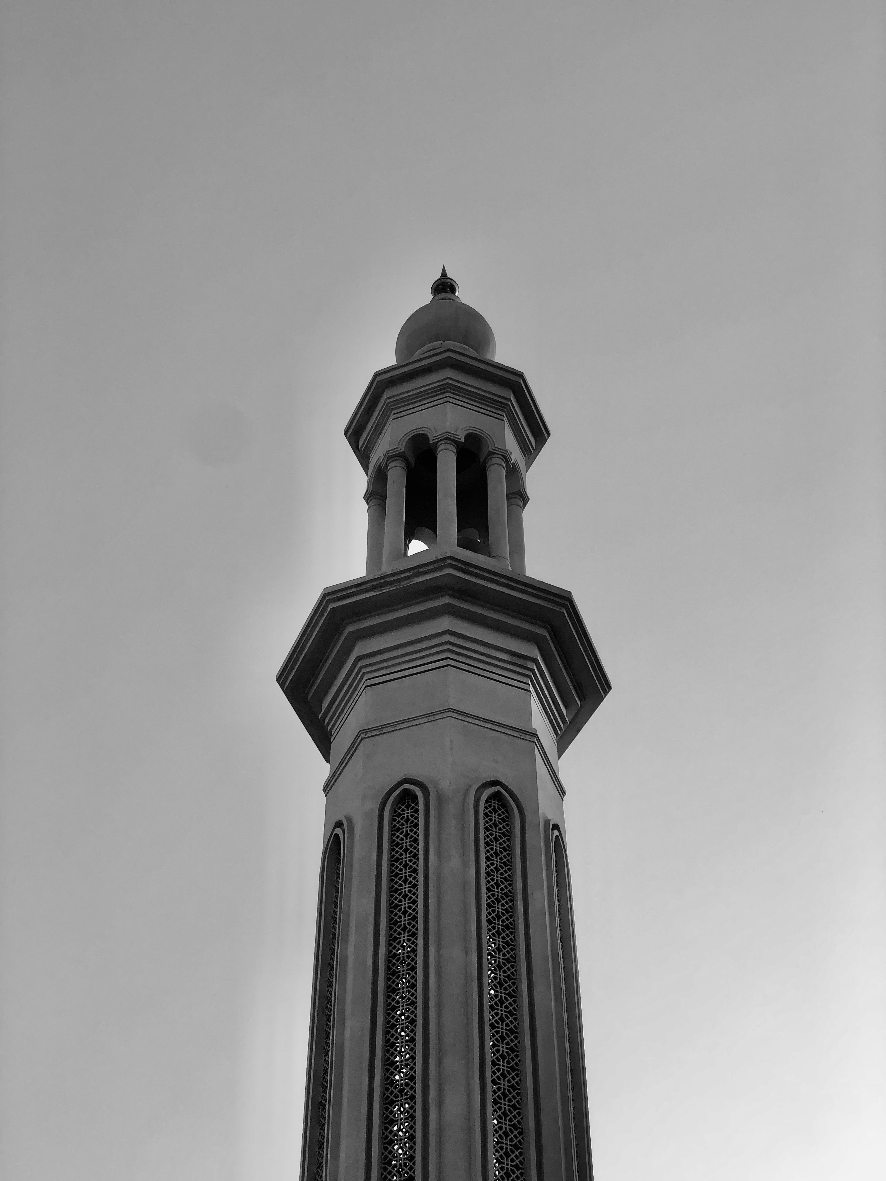 Black and White Minaret against Clear Sky · Free Stock Photo
