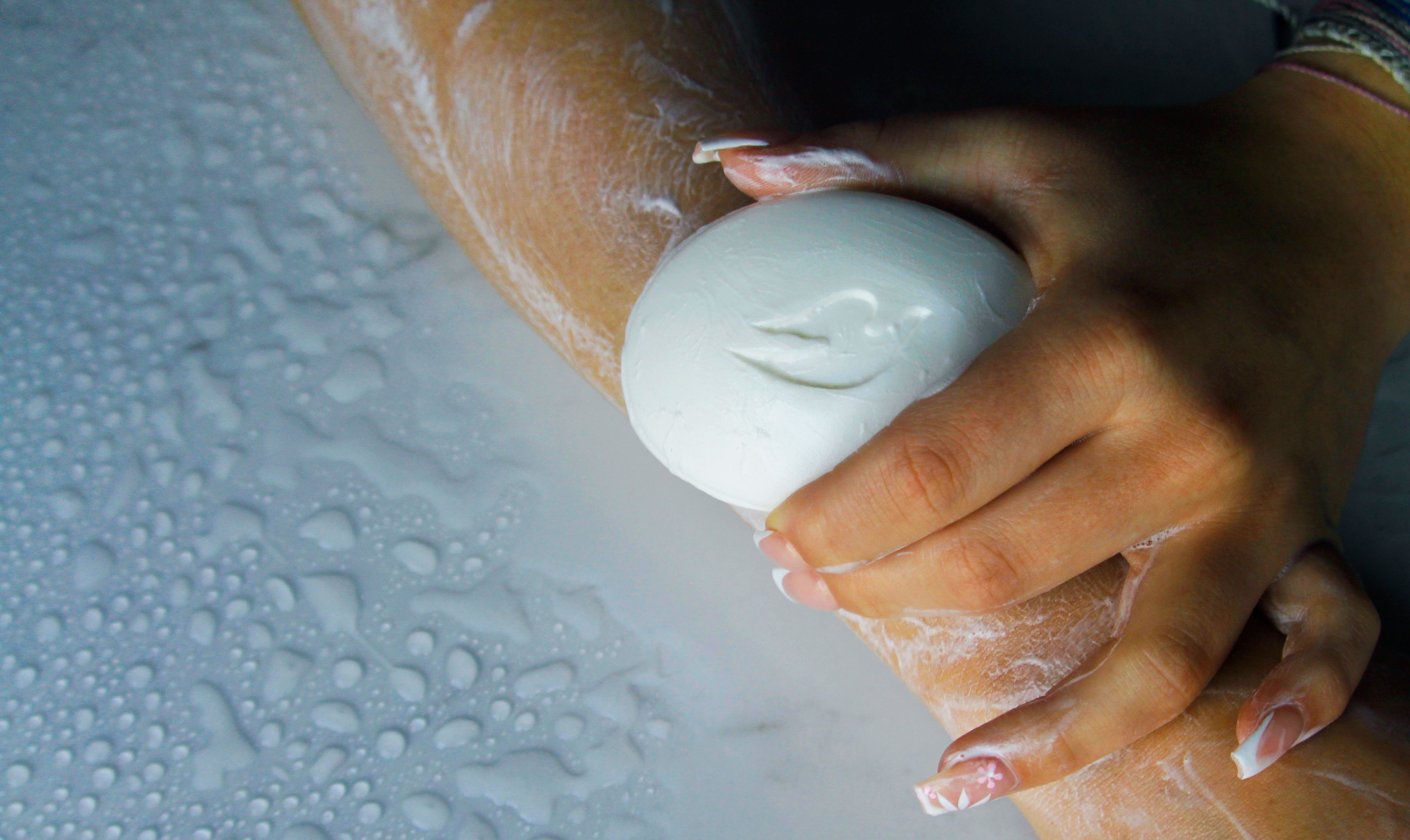 Close-up of Hand with Soap and Lather · Free Stock Photo