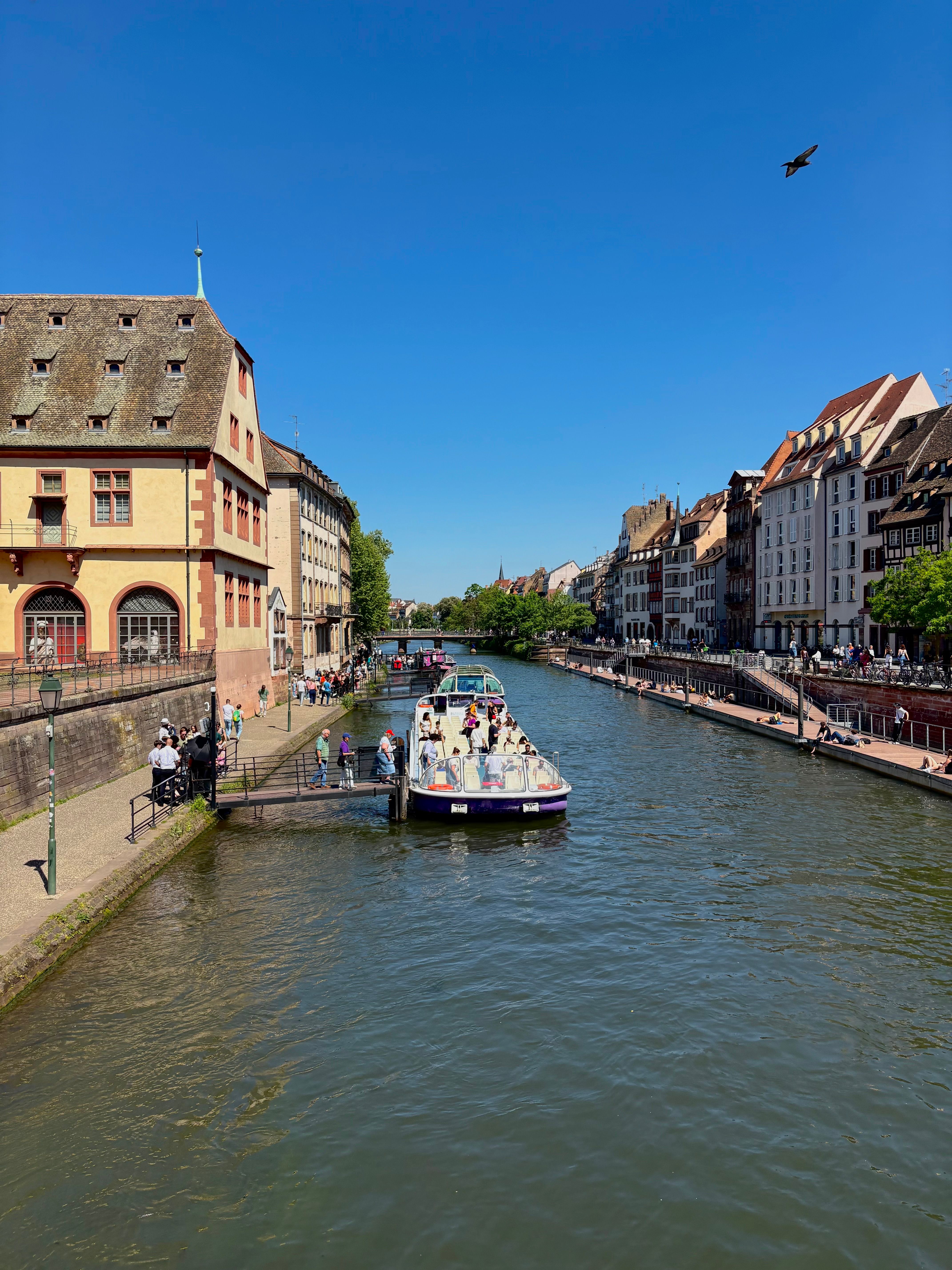 Scenic Canal View with Historic Buildings and Boat · Free Stock Photo