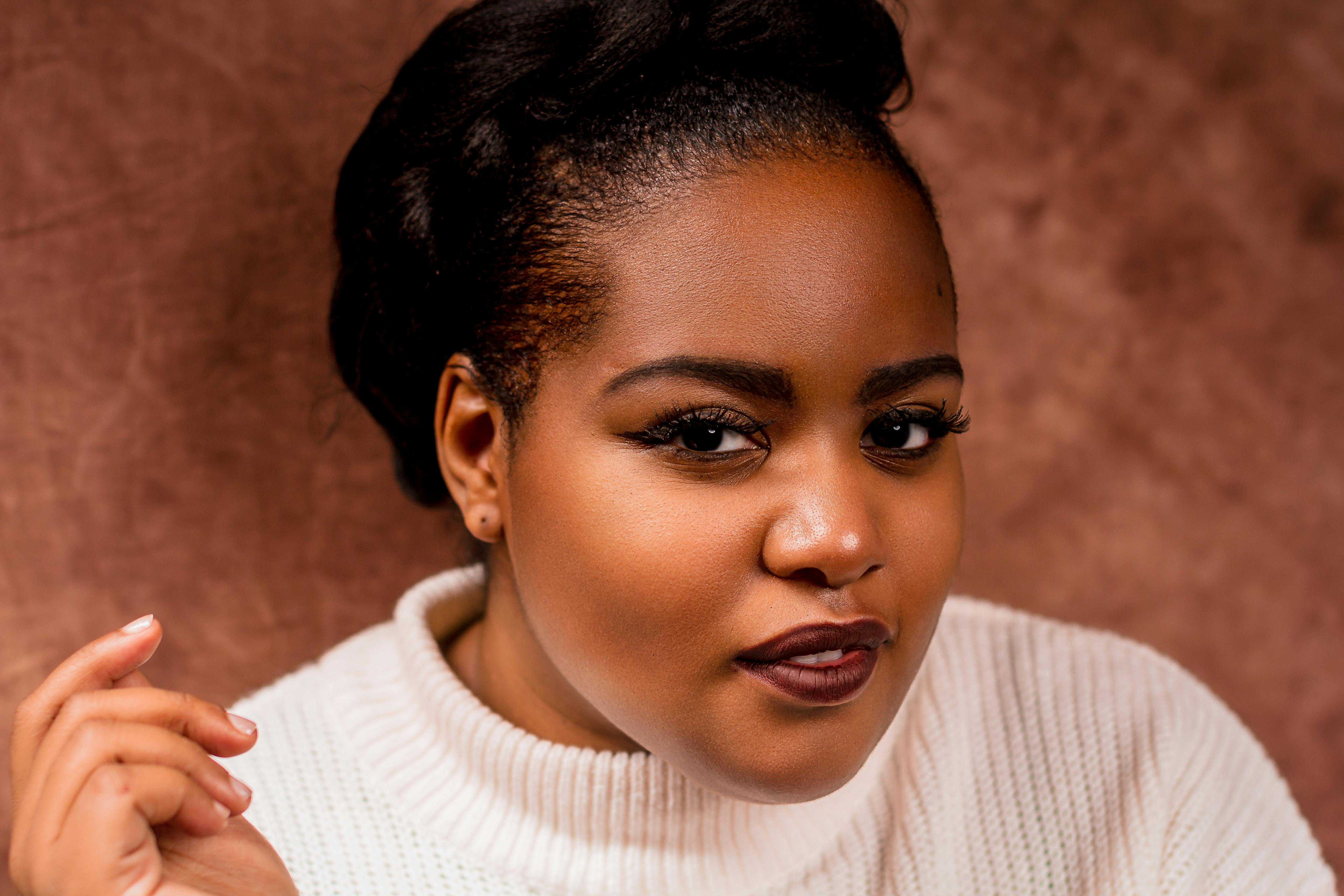 Selective Focus Photography of Woman Wearing White Top · Free Stock Photo