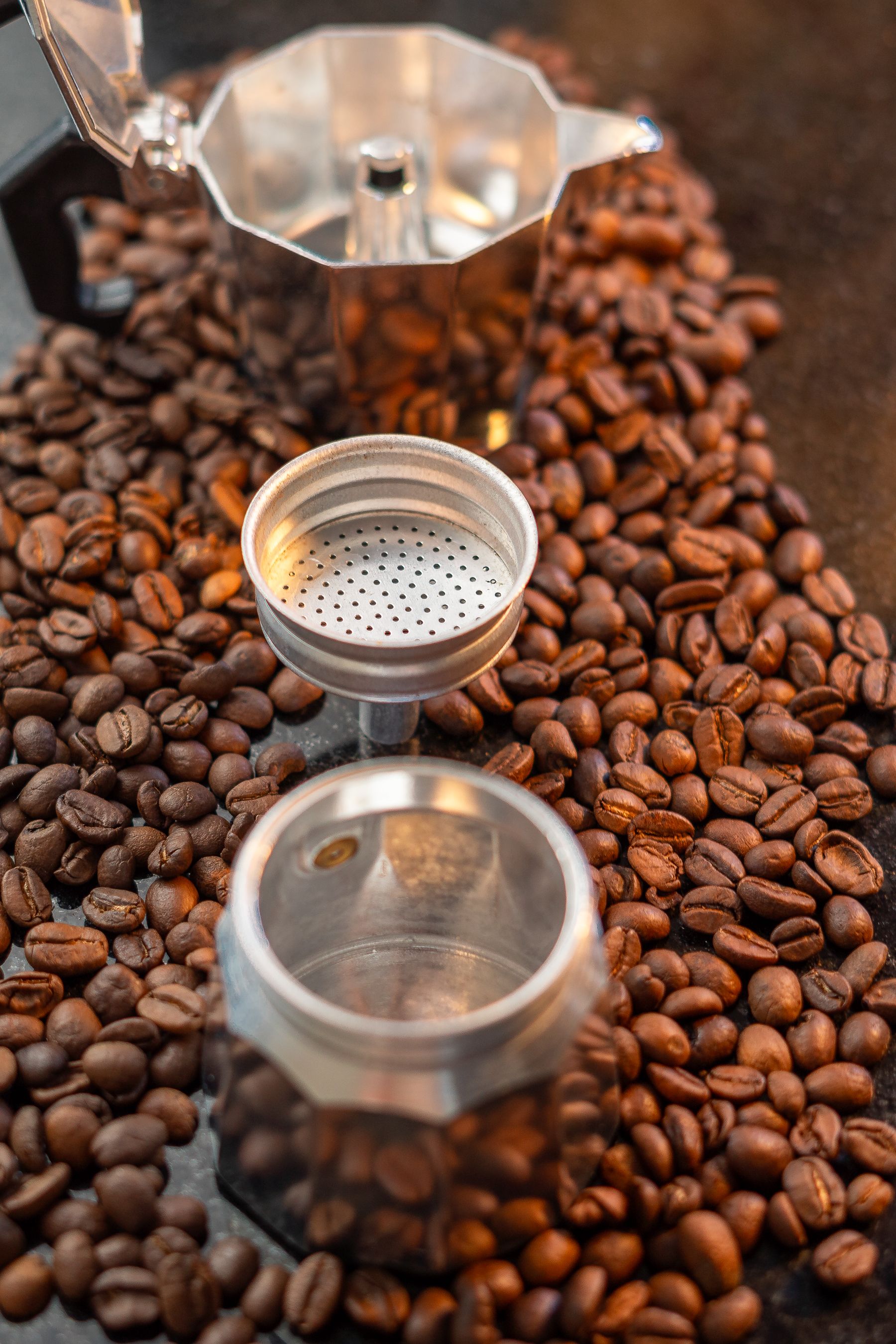 Close-Up of Coffee Beans with Moka Pot · Free Stock Photo