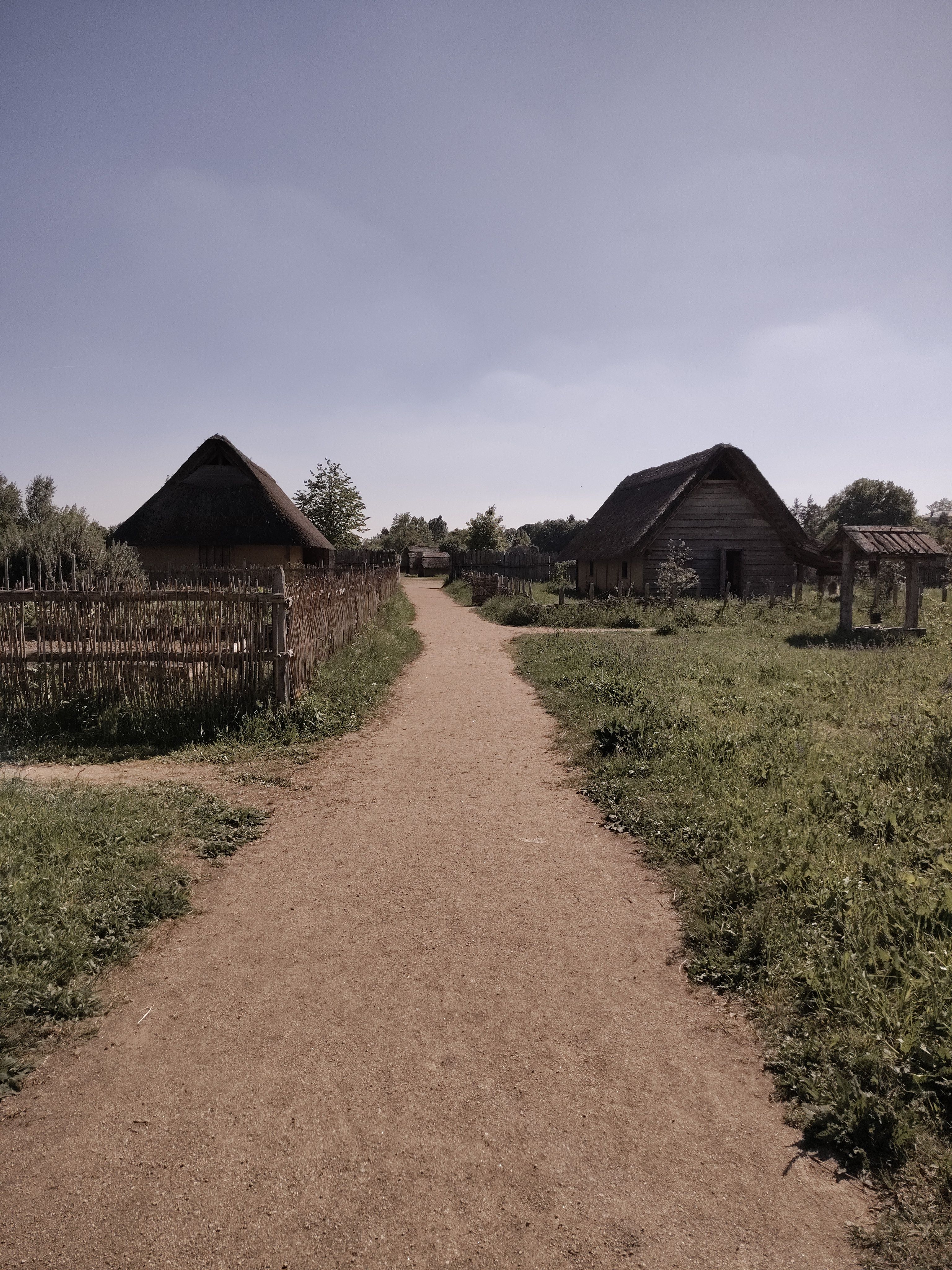 Rural Pathway Through Traditional Village · Free Stock Photo