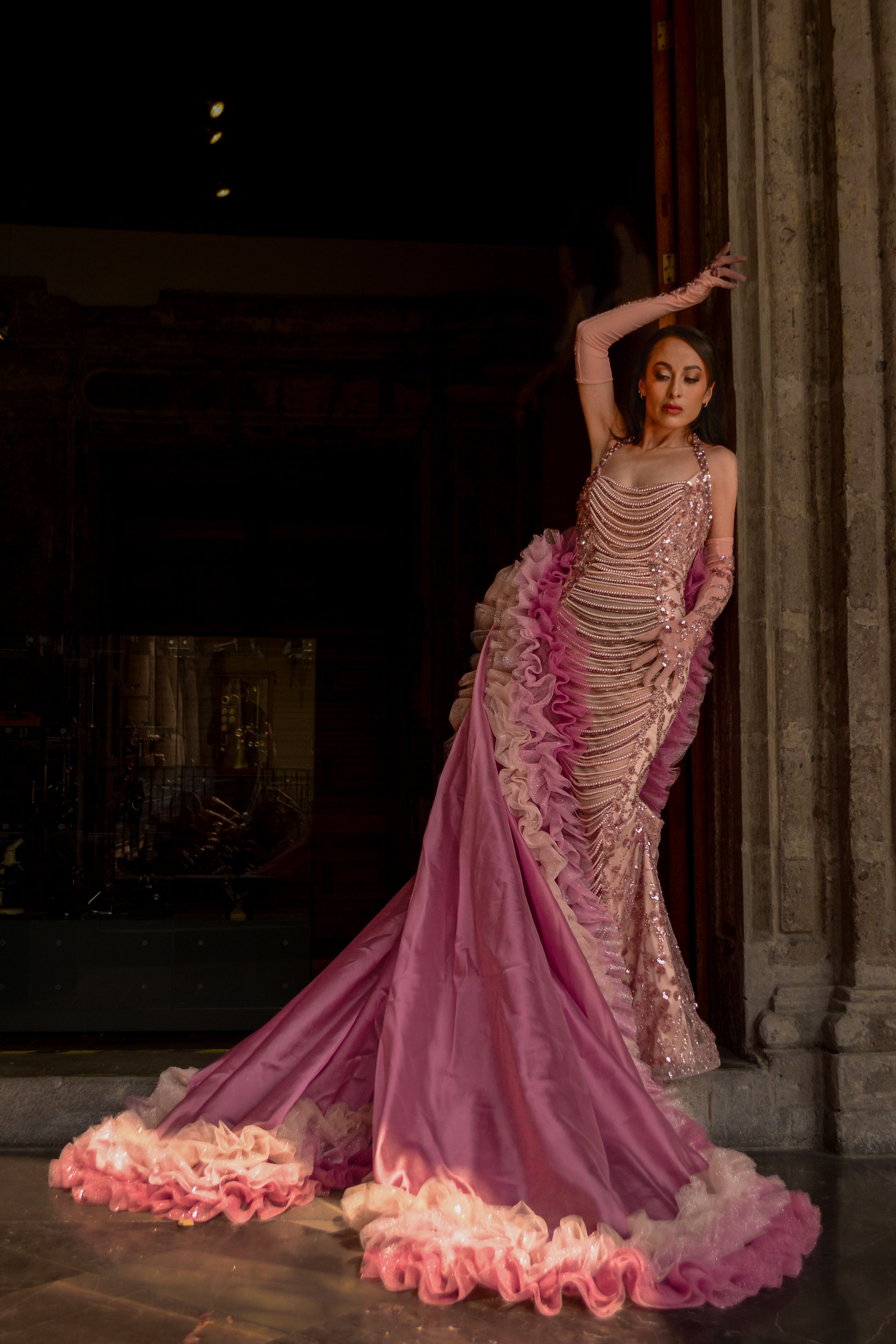 Elegant Woman in Pink Gown Standing Gracefully · Free Stock Photo