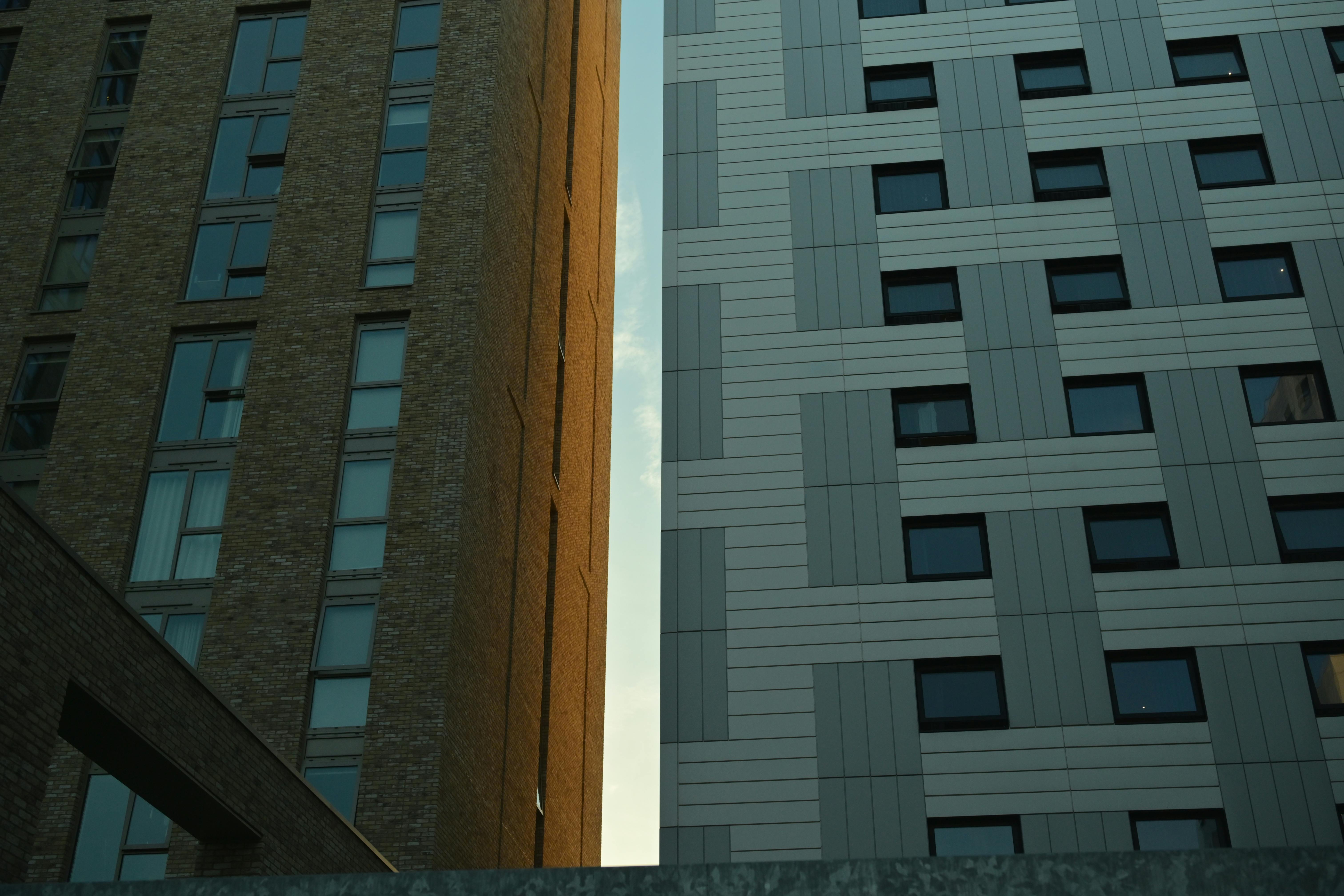 Modern Architectural Facade with Geometric Patterns · Free Stock Photo