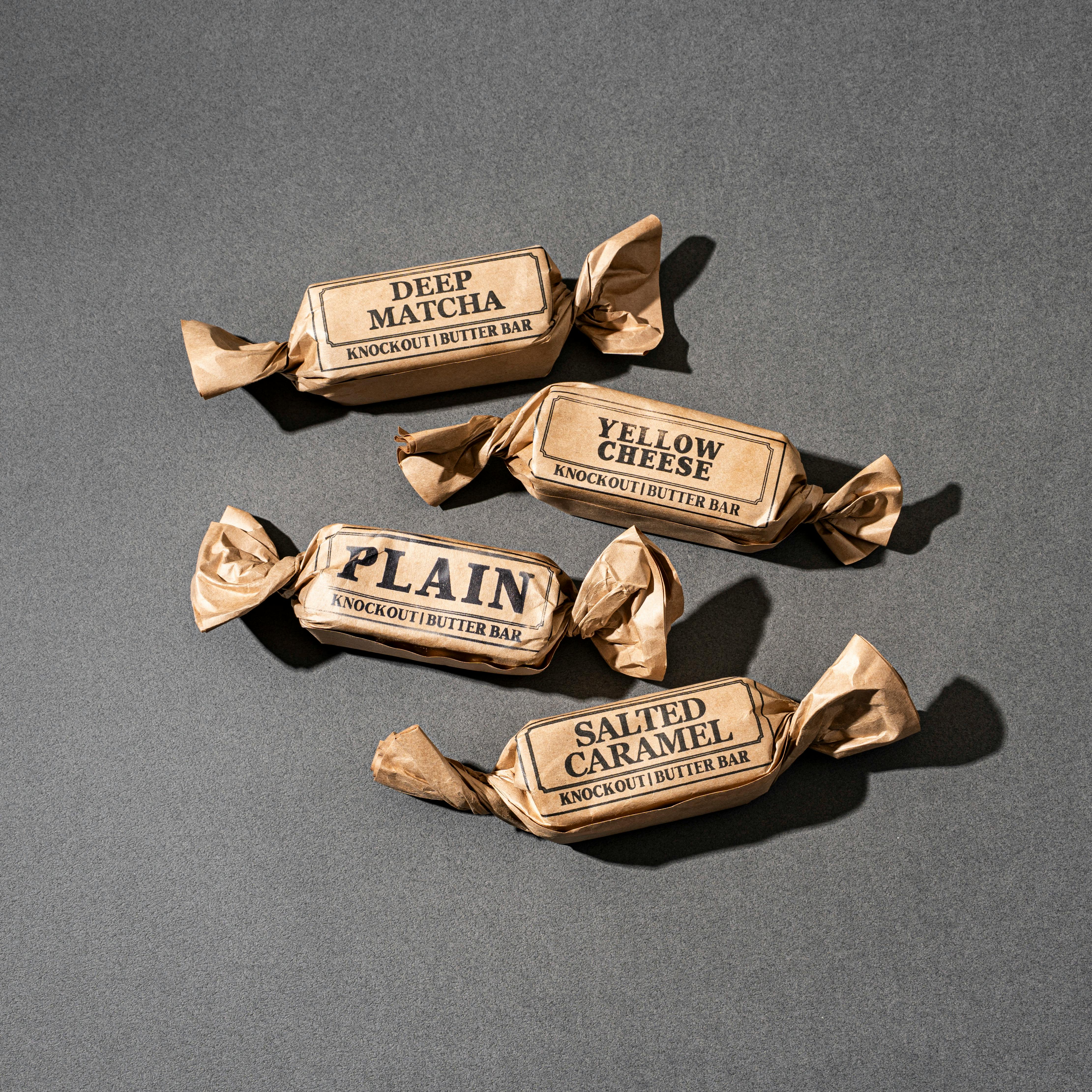 Assorted Knockout Butter Bars on Dark Surface · Free Stock Photo