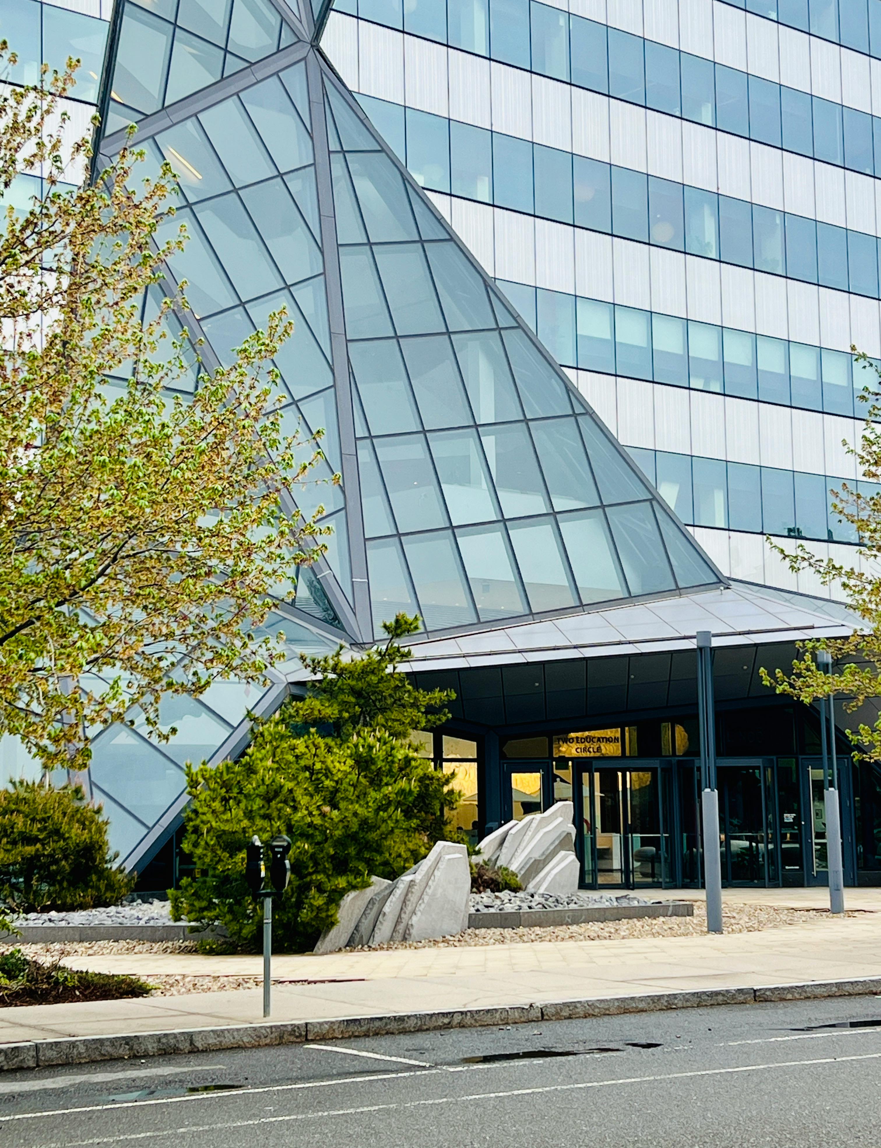Modern Glass Building Entrance with Geometric Design · Free Stock Photo