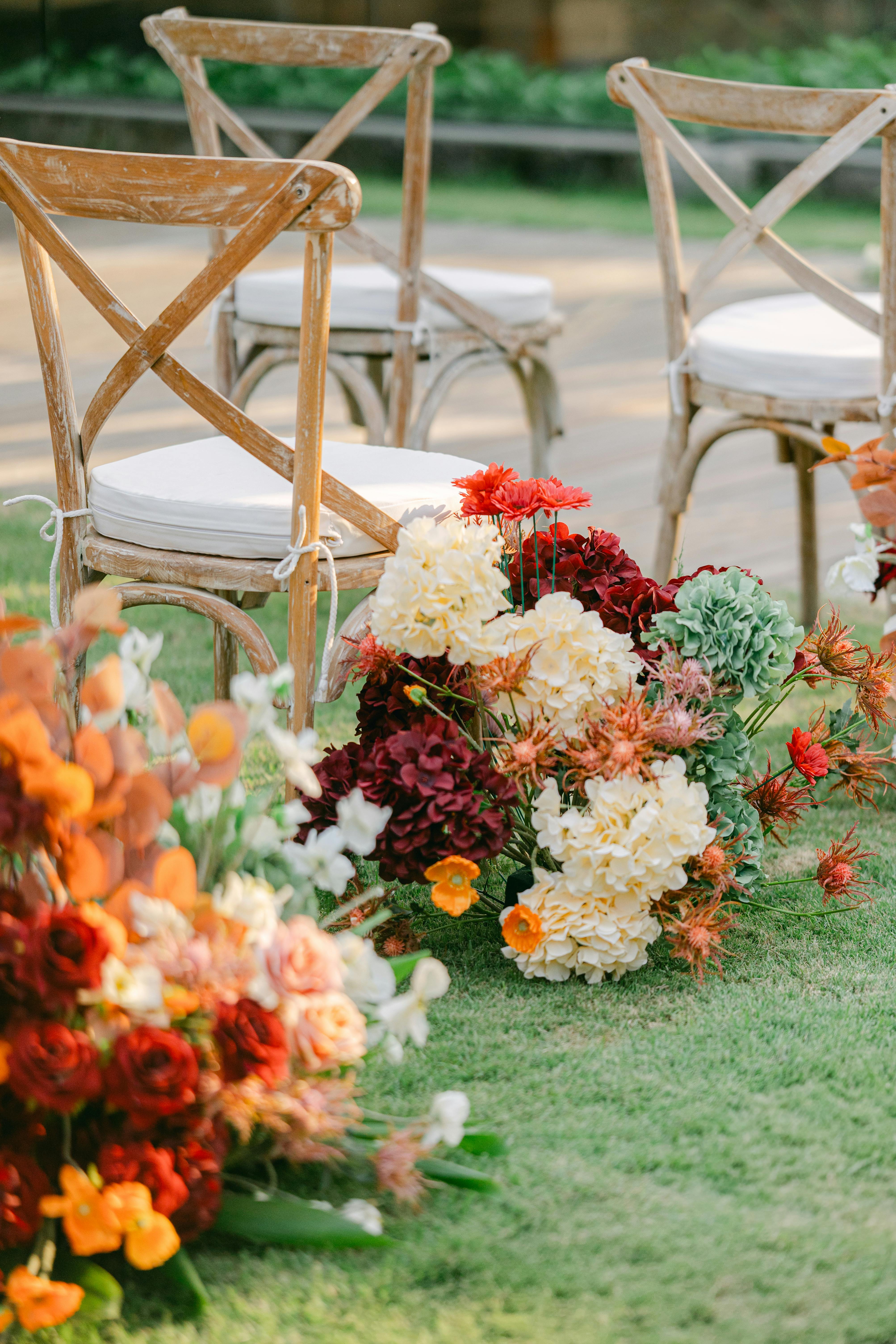 Rustic Outdoor Wedding Ceremony with Flowers · Free Stock Photo