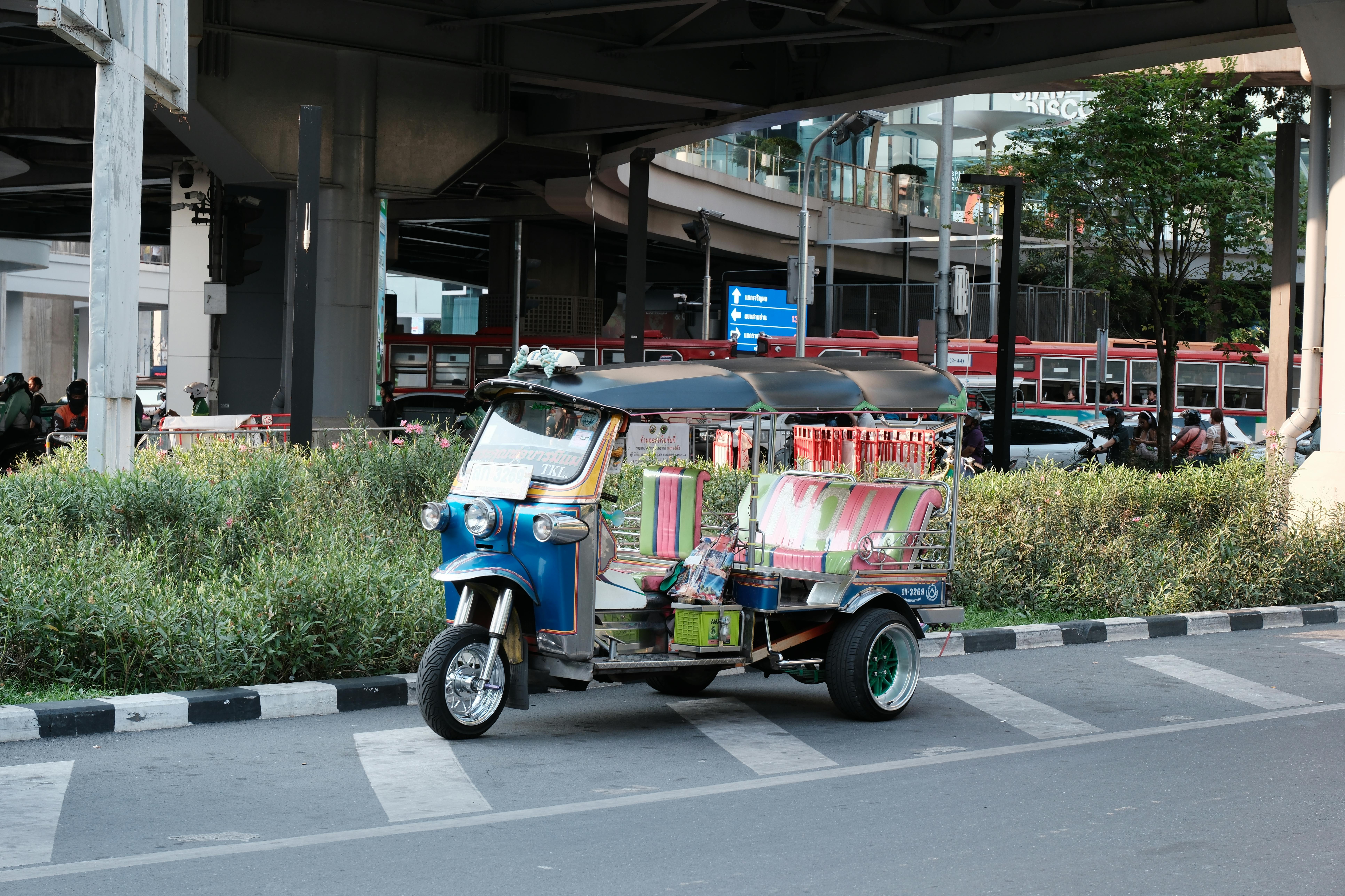 Colorful Tuk Tuk on Bustling Bangkok Street · Free Stock Photo