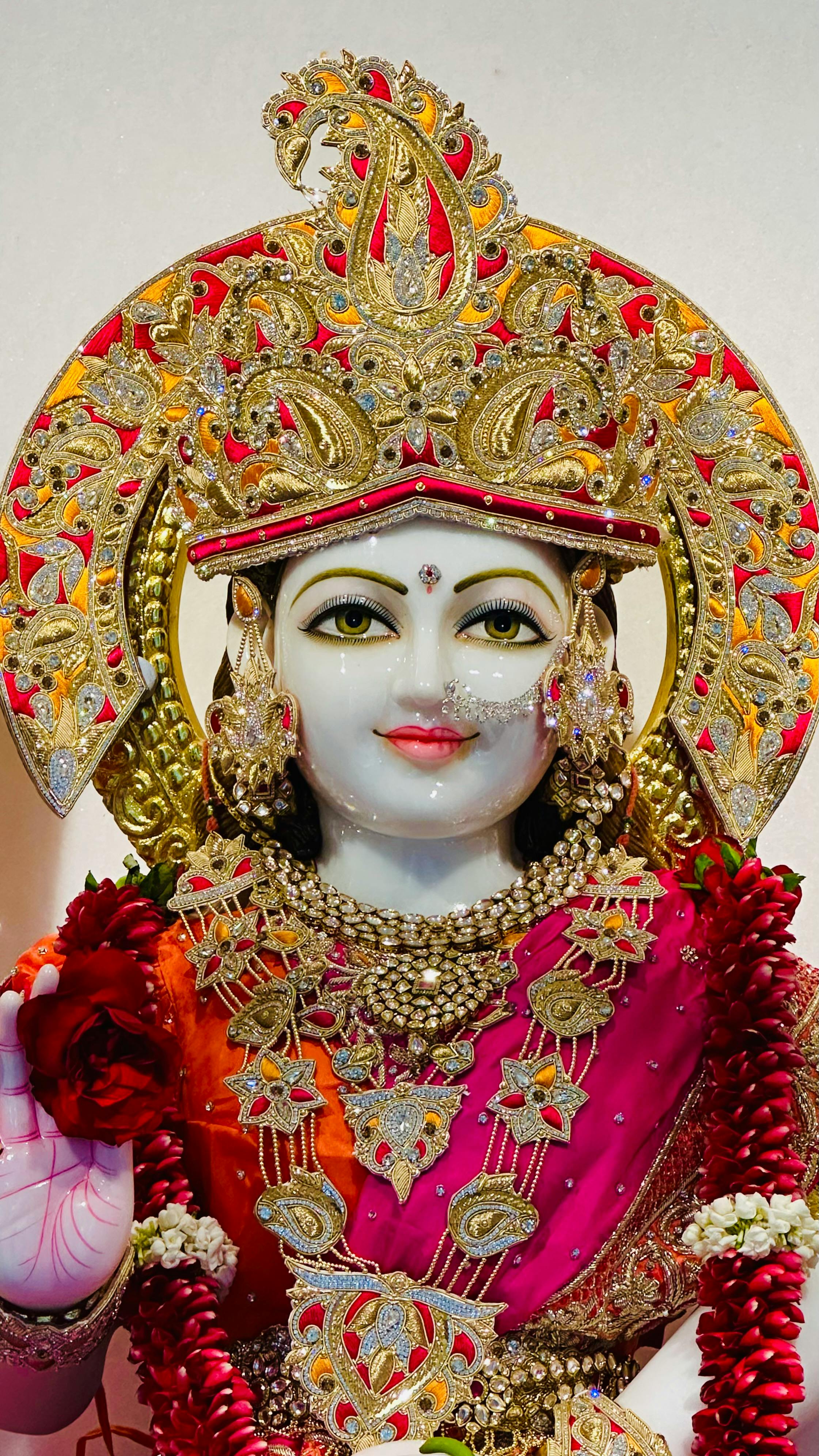 Colorful Hindu Deity Statue with Ornate Decorations · Free Stock Photo