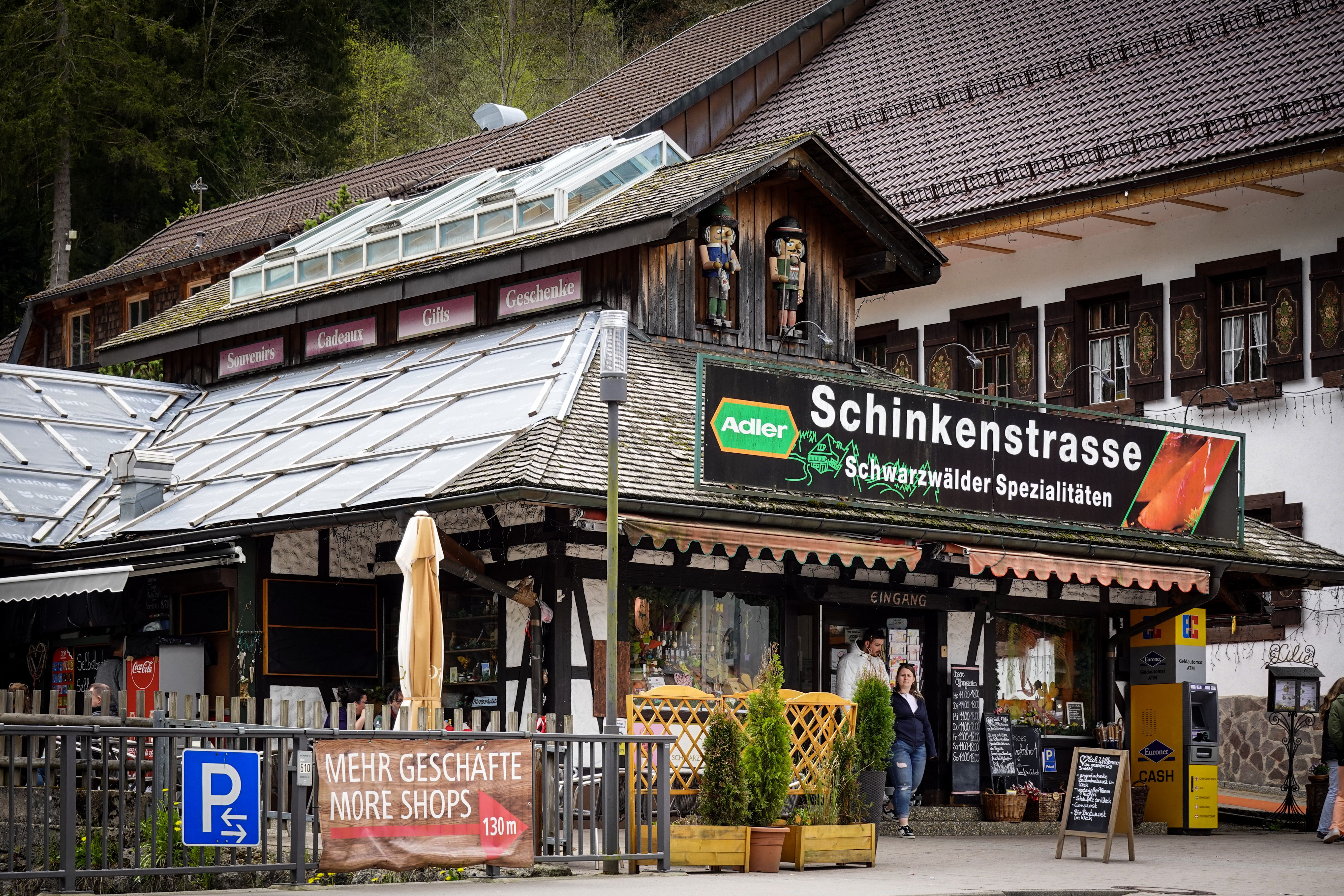 Traditional Bavarian Wooden Cabin Shopfront with Signage · Free Stock Photo