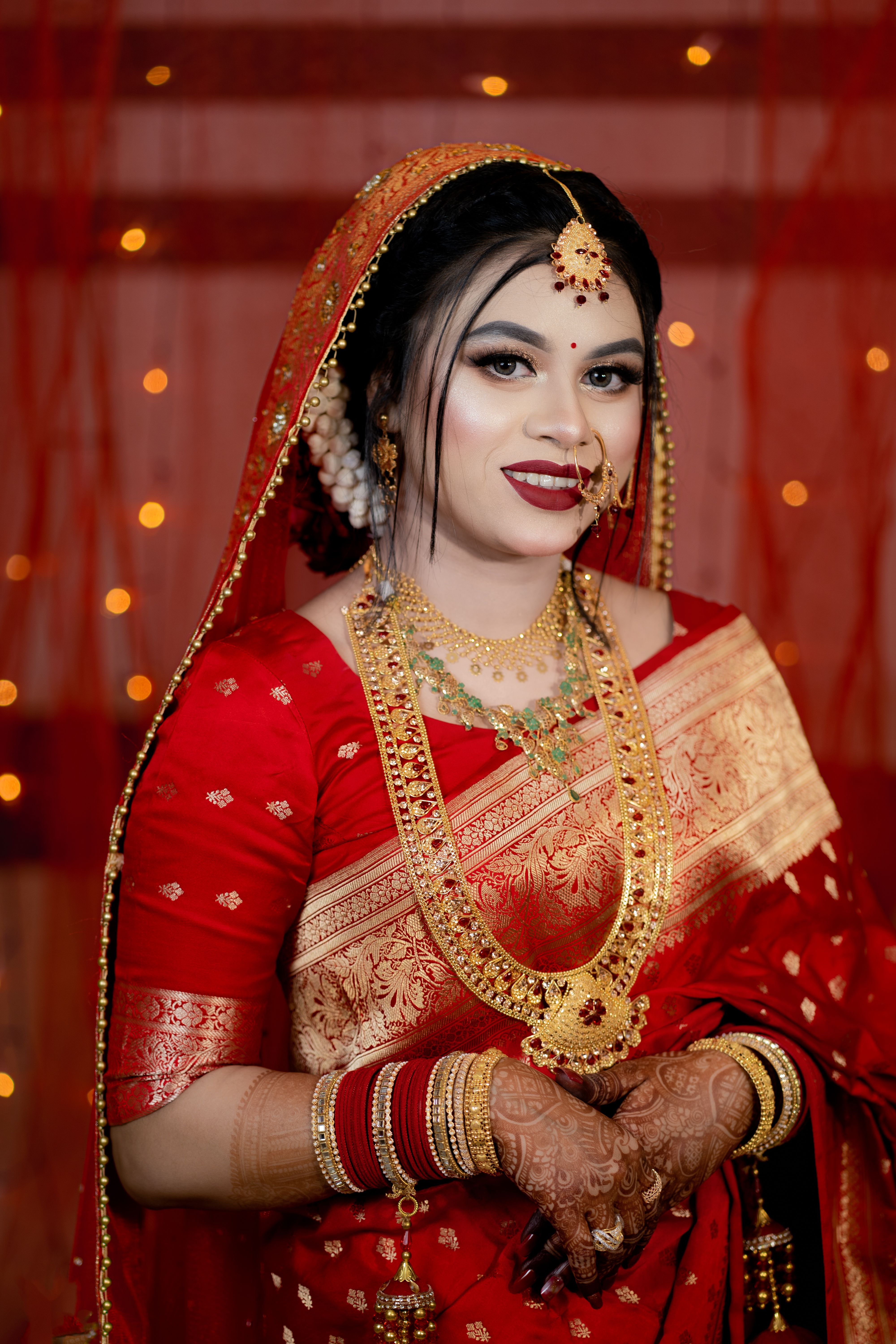 Beautiful Bride in Traditional Red Wedding Attire · Free Stock Photo