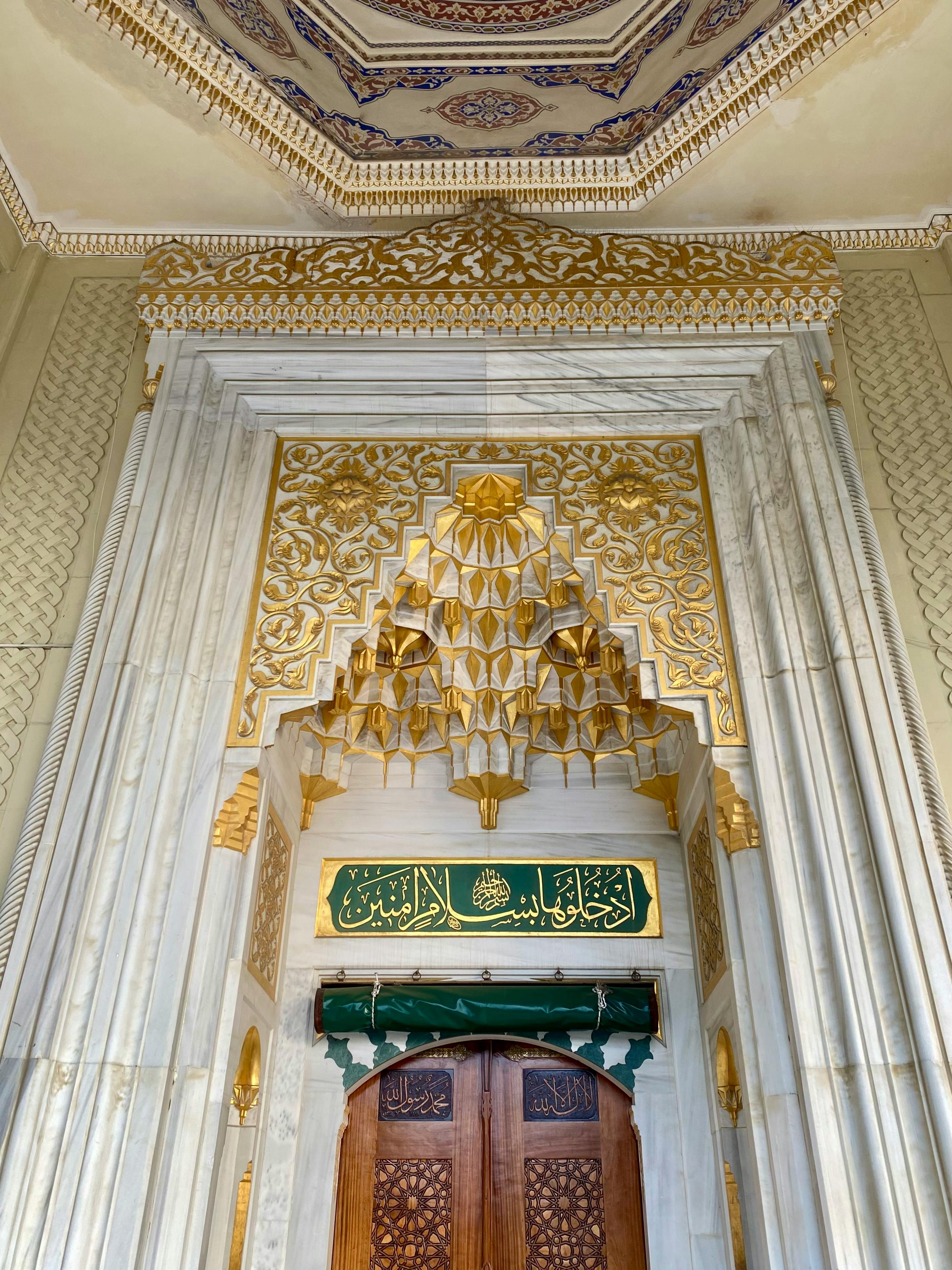 Intricate Islamic Architecture with Arabic Calligraphy · Free Stock Photo