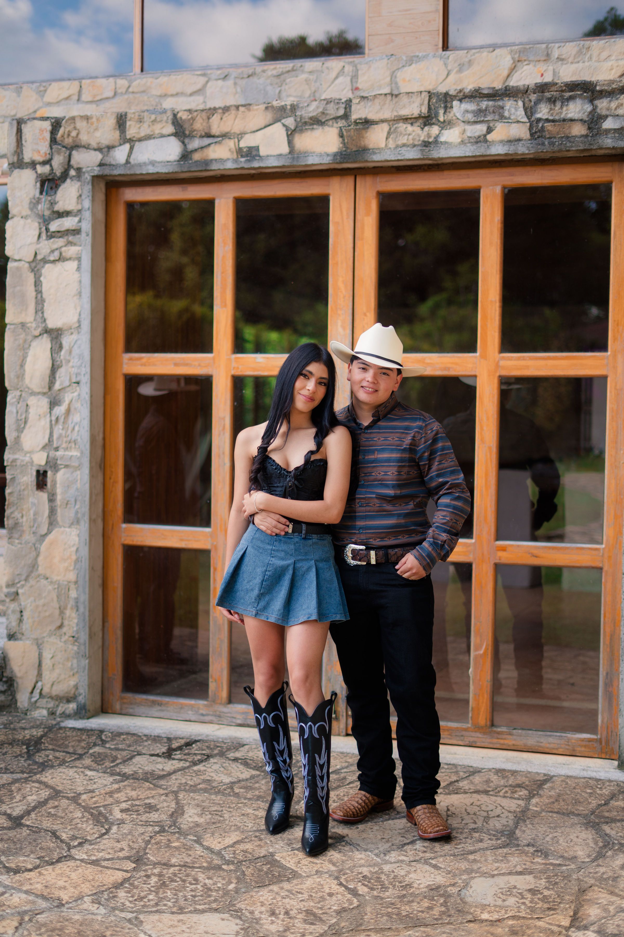 Young Couple in Stylish Western Outfits Outdoors · Free Stock Photo