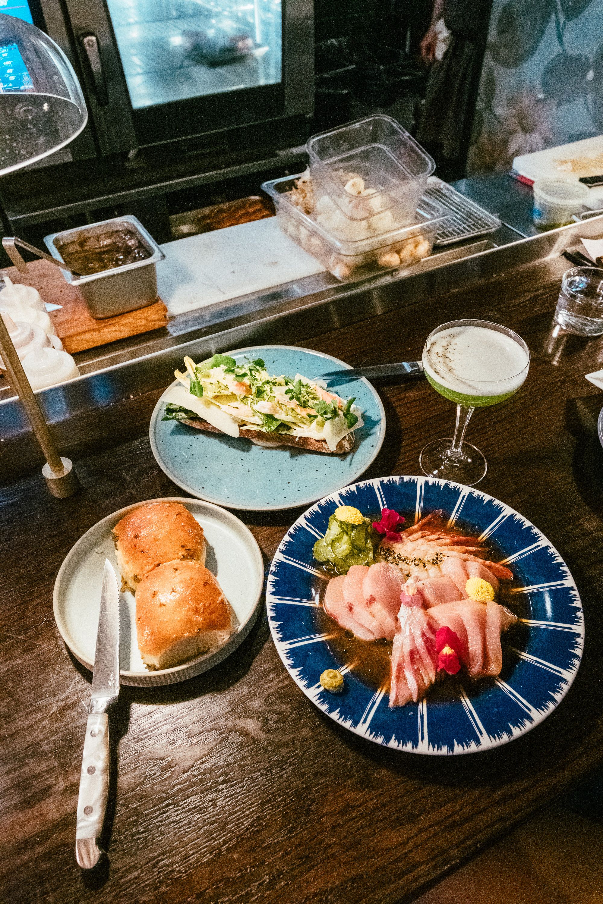 Gourmet Japanese Cuisine with Sashimi Counter · Free Stock Photo