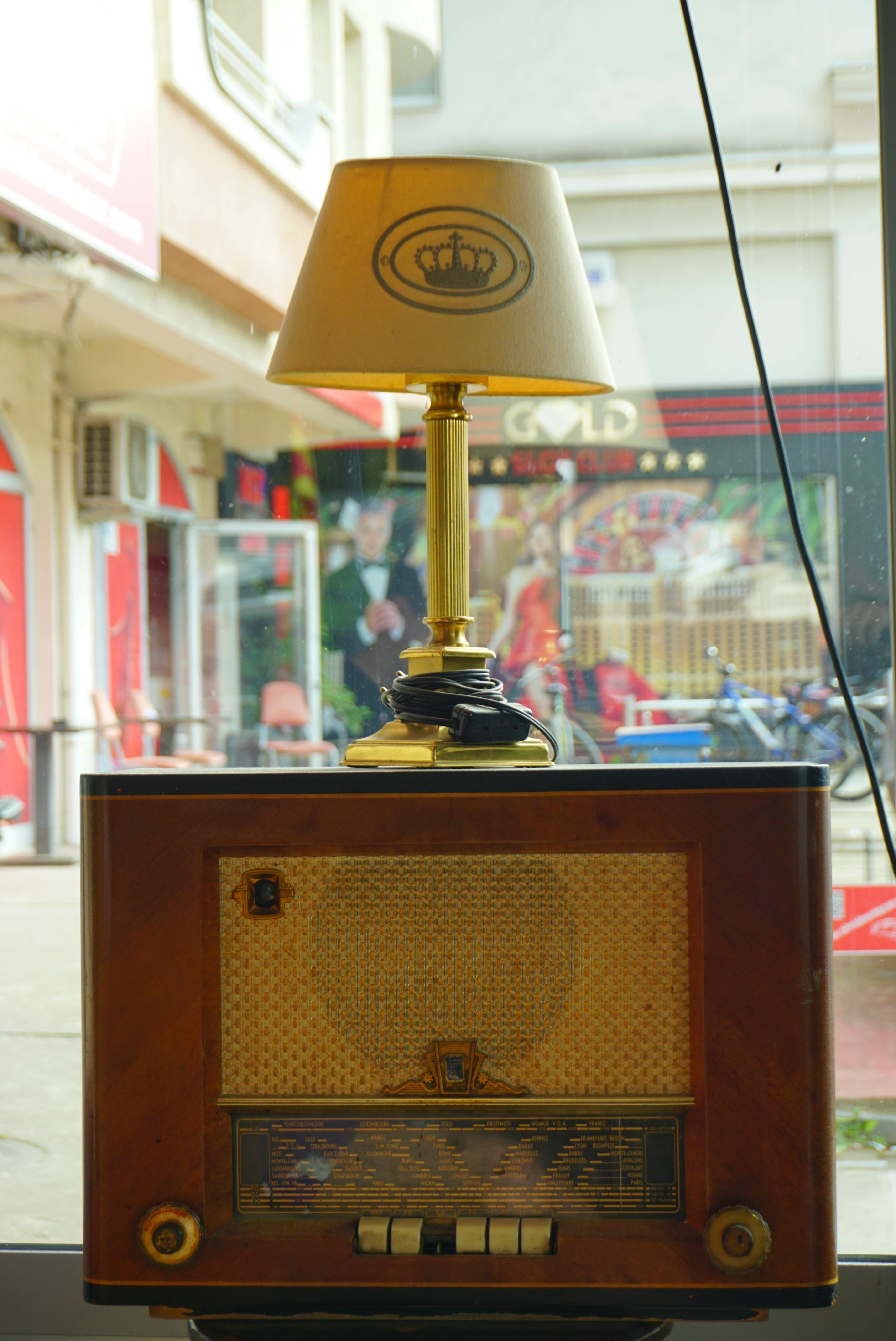 Vintage Radio with Lamp in Storefront Display · Free Stock Photo