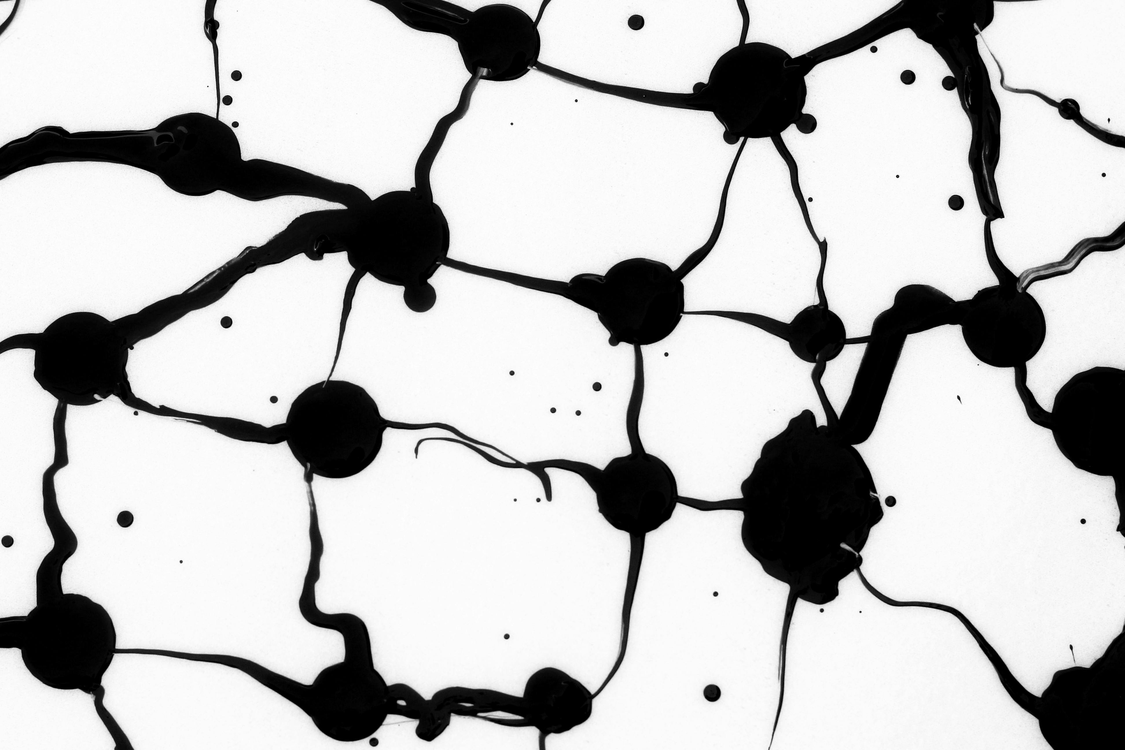 Abstract Black Ink Pattern on White Surface · Free Stock Photo