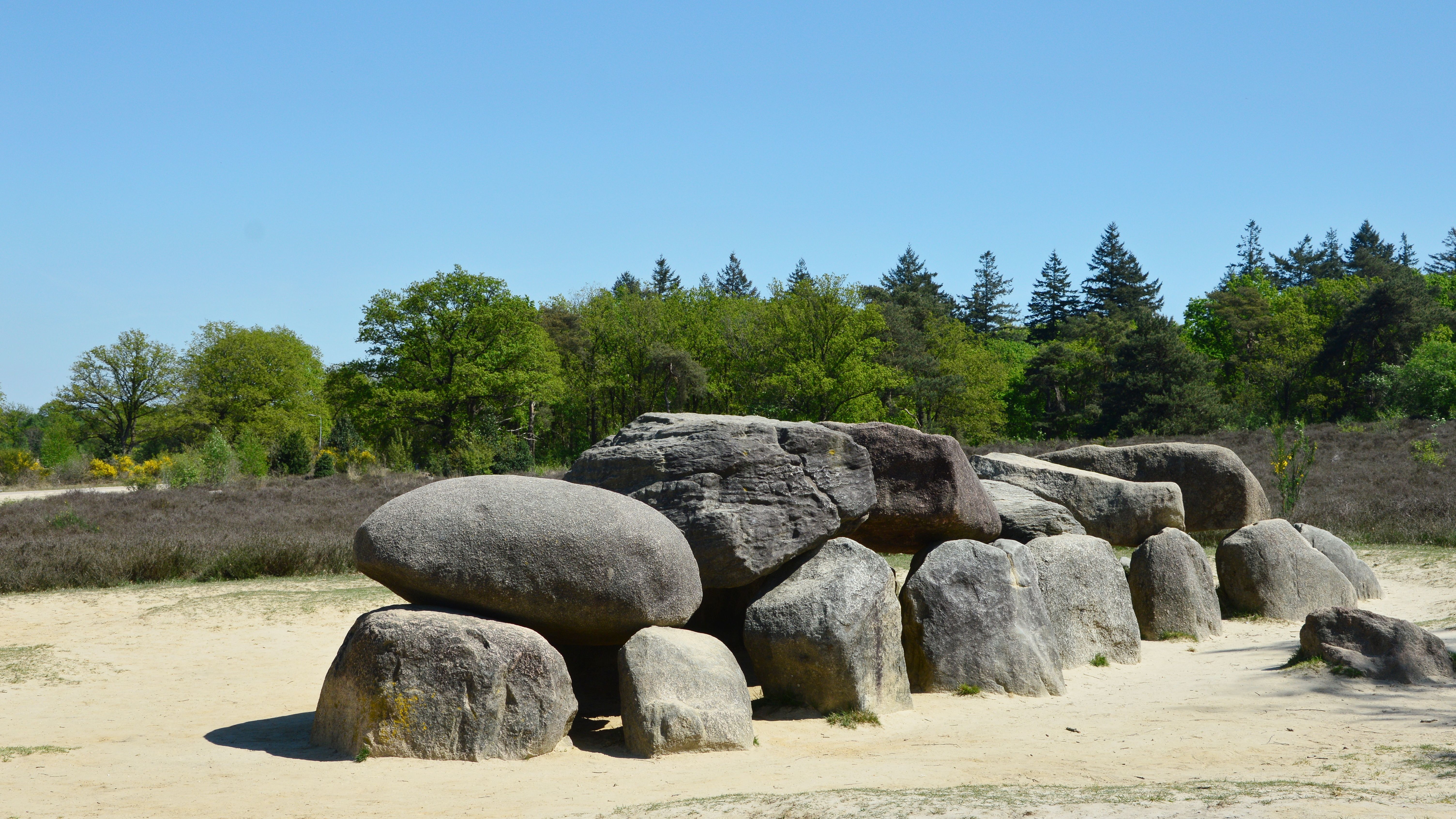 Ancient Stone Formation in a Forest Setting · Free Stock Photo