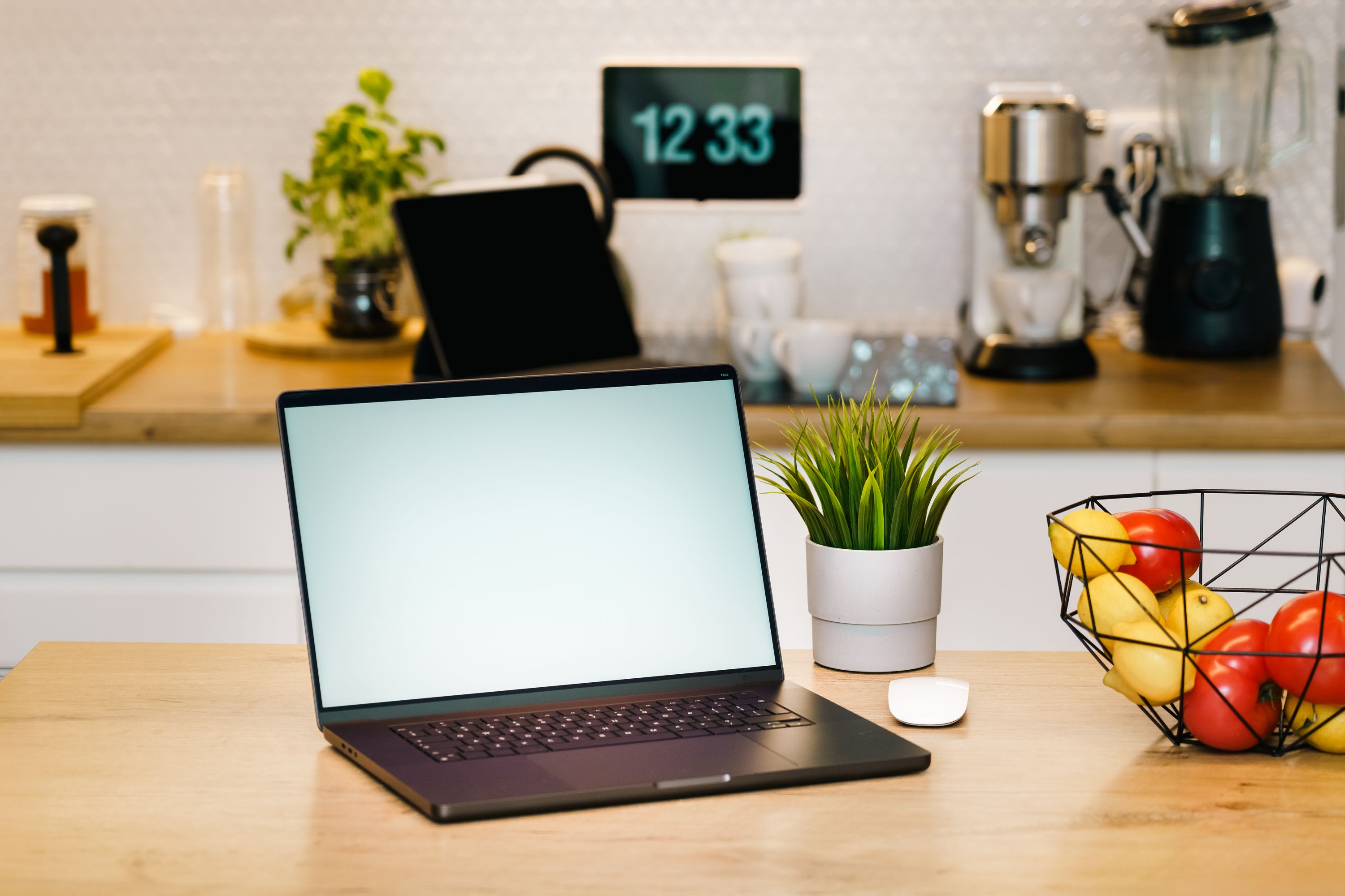 Modern Home Office with Laptop on Kitchen Counter · Free Stock Photo