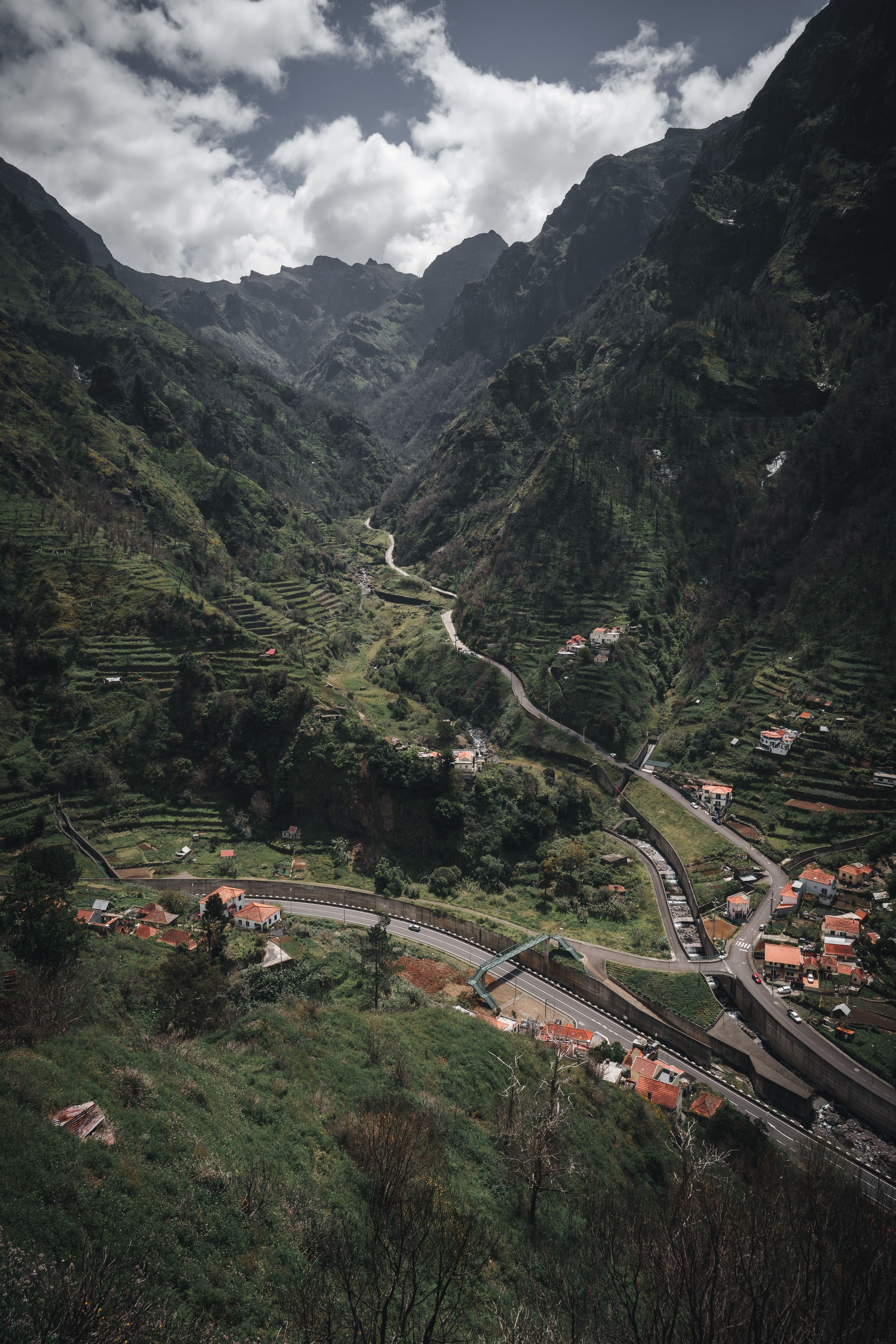 Scenic View of Verdant Mountains and Winding Road · Free Stock Photo