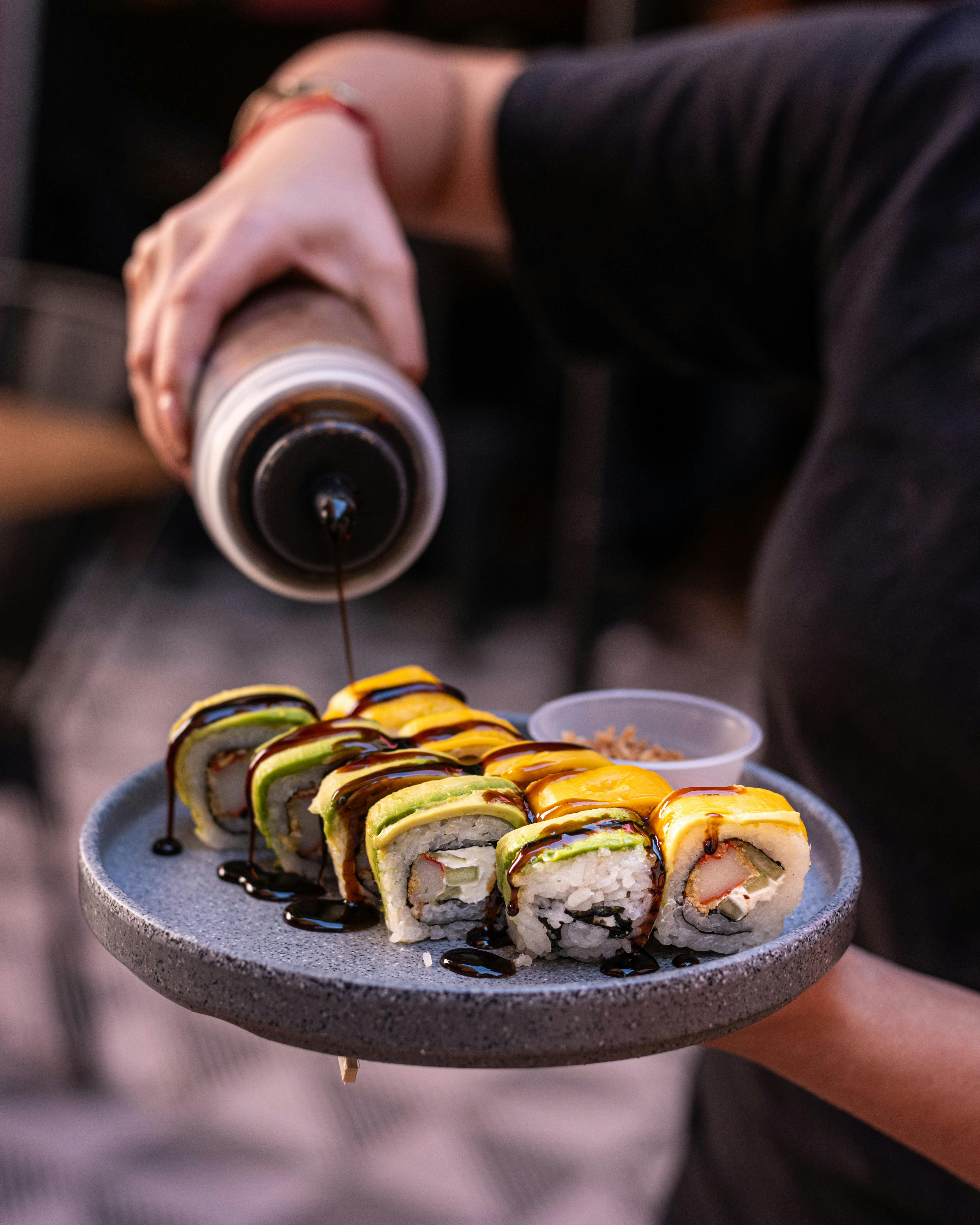 Vibrant Sushi Roll Platter with Soy Glaze · Free Stock Photo