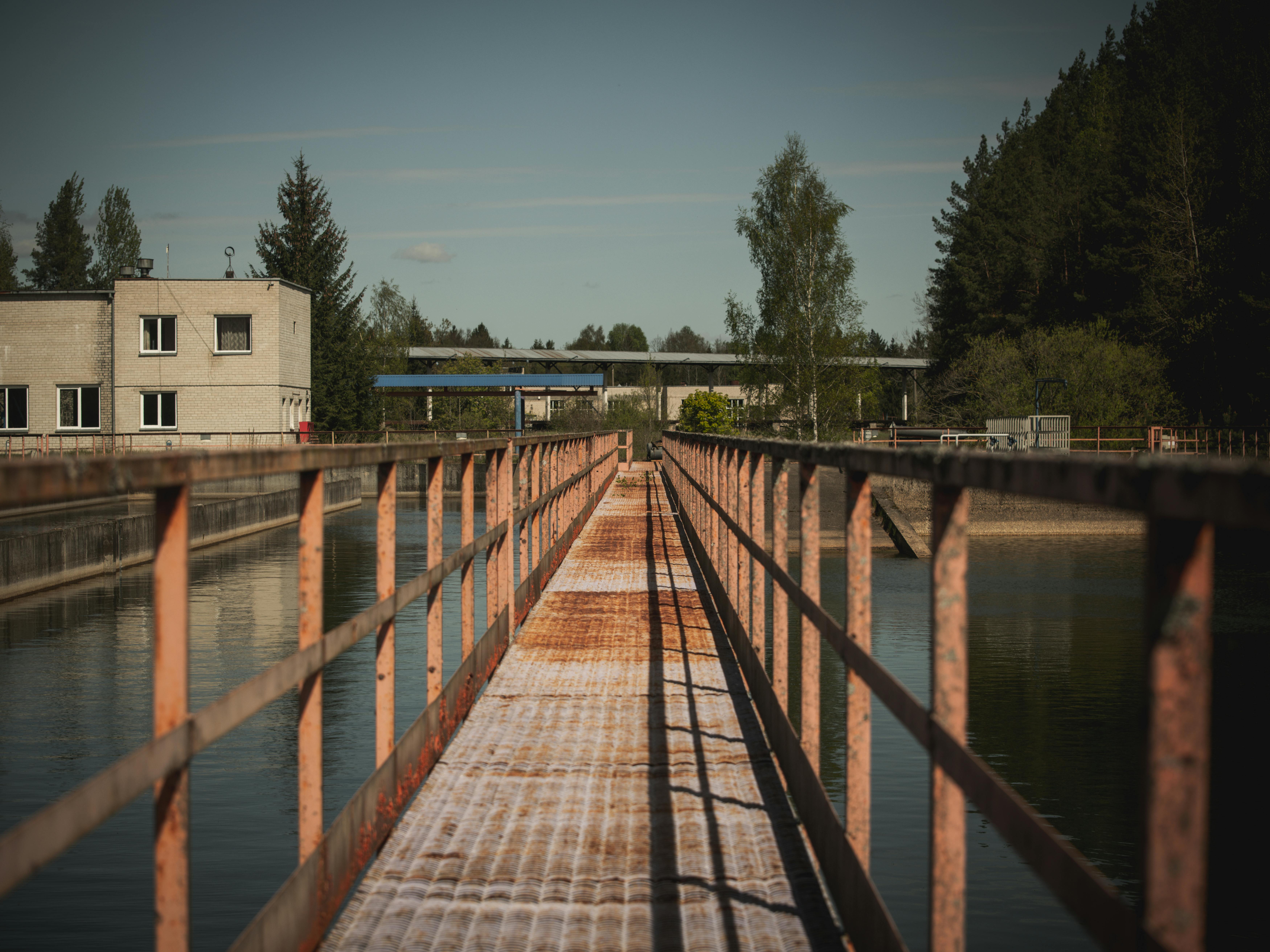 Rusty Pedestrian Bridge in Lithuanian Industrial Area · Free Stock Photo