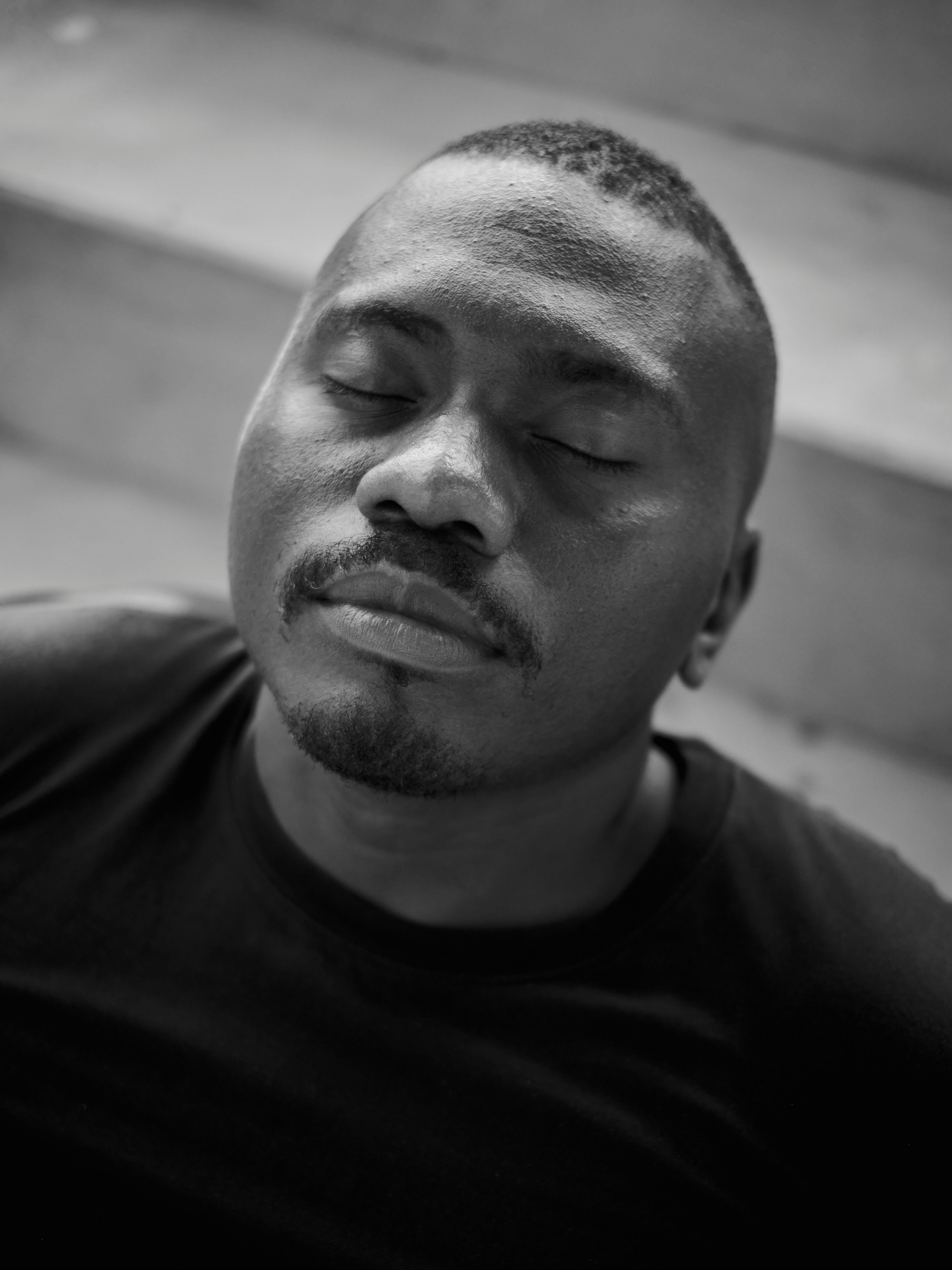 Peaceful Contemplation in Black and White Portrait · Free Stock Photo