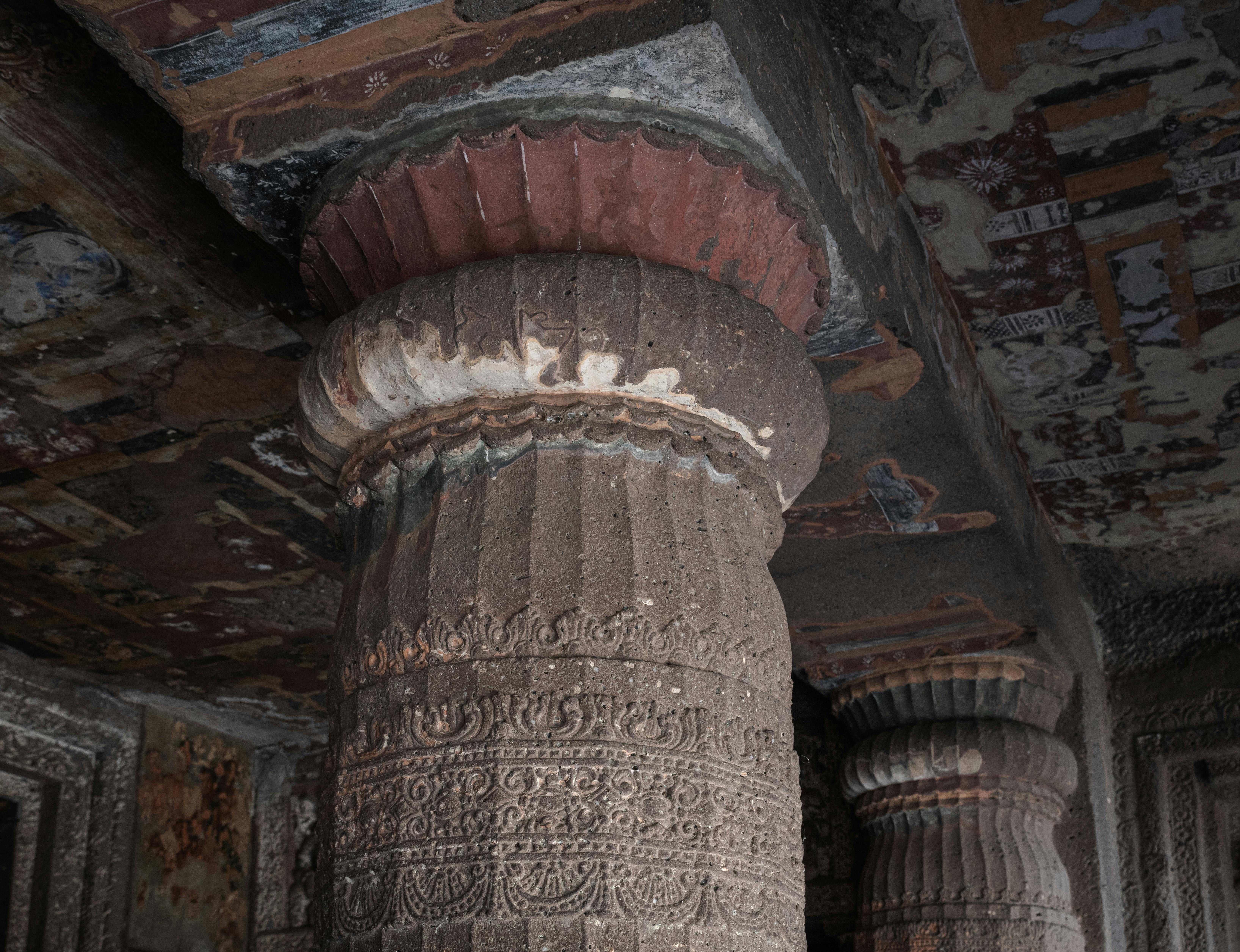 Intricate Stone Column at Ajanta Caves, India · Free Stock Photo