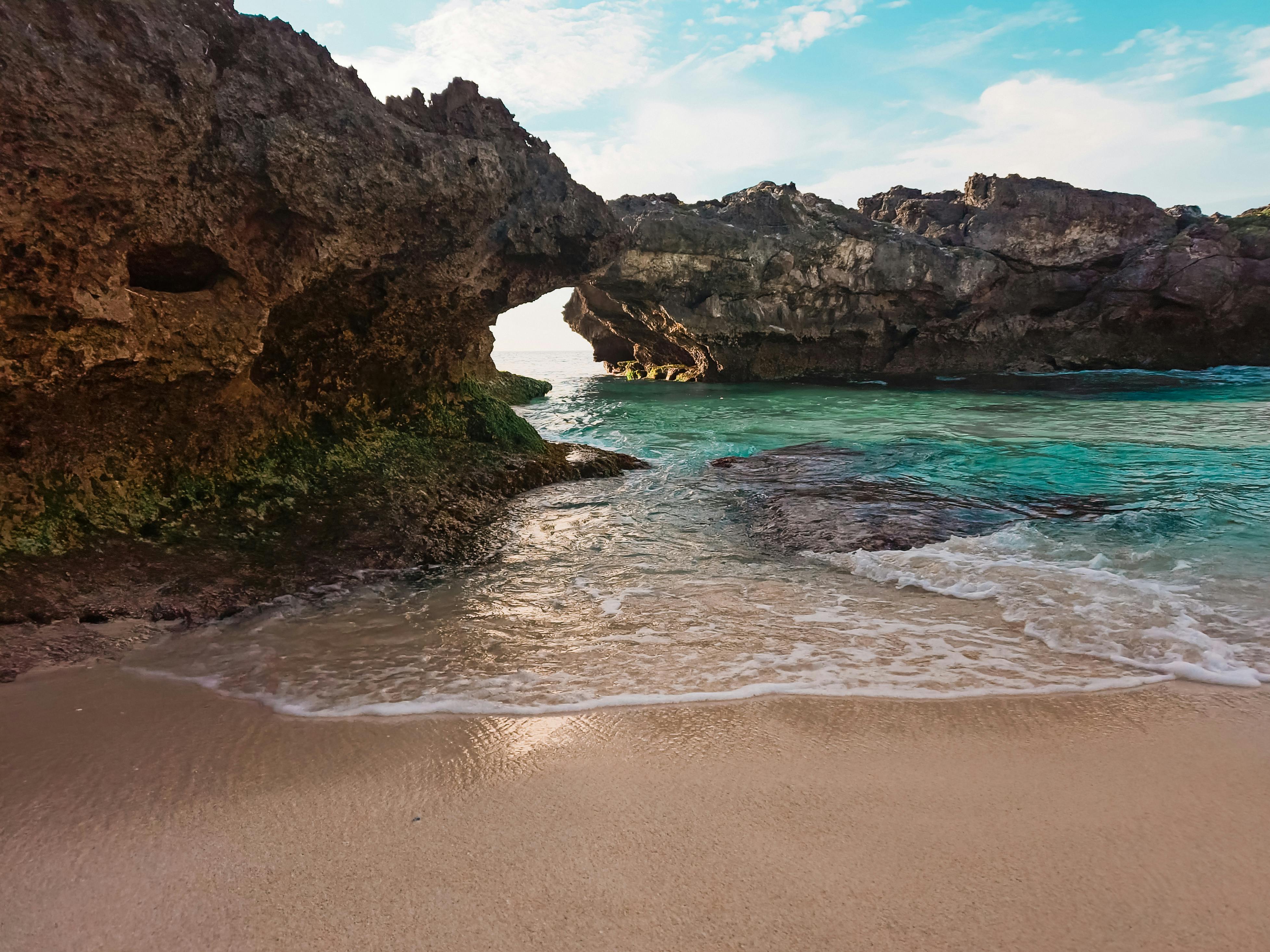 Scenic Coastal Rock Formation with Turquoise Waters · Free Stock Photo