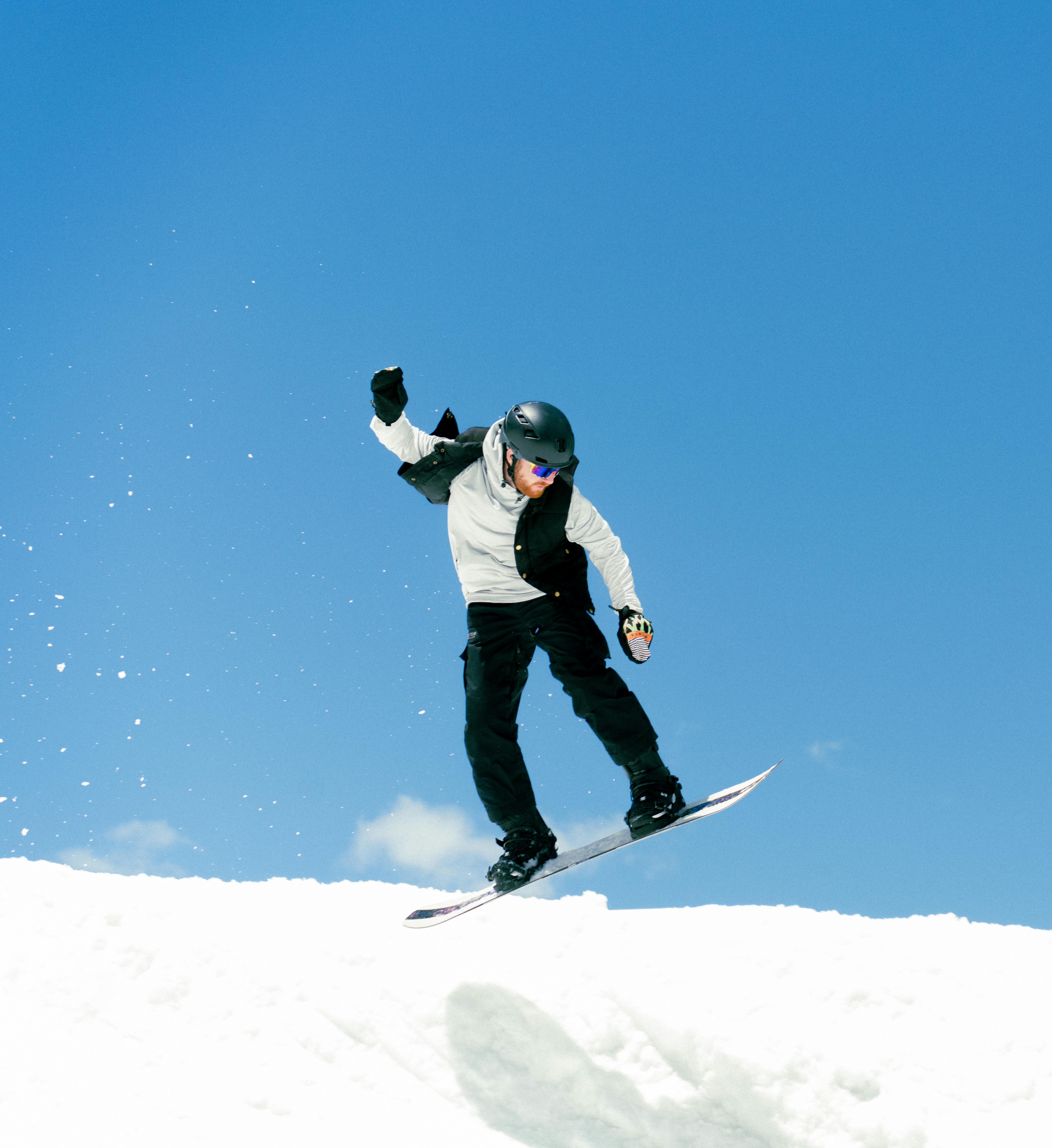 Dynamic Snowboarding Trick in Spring at Brighton · Free Stock Photo