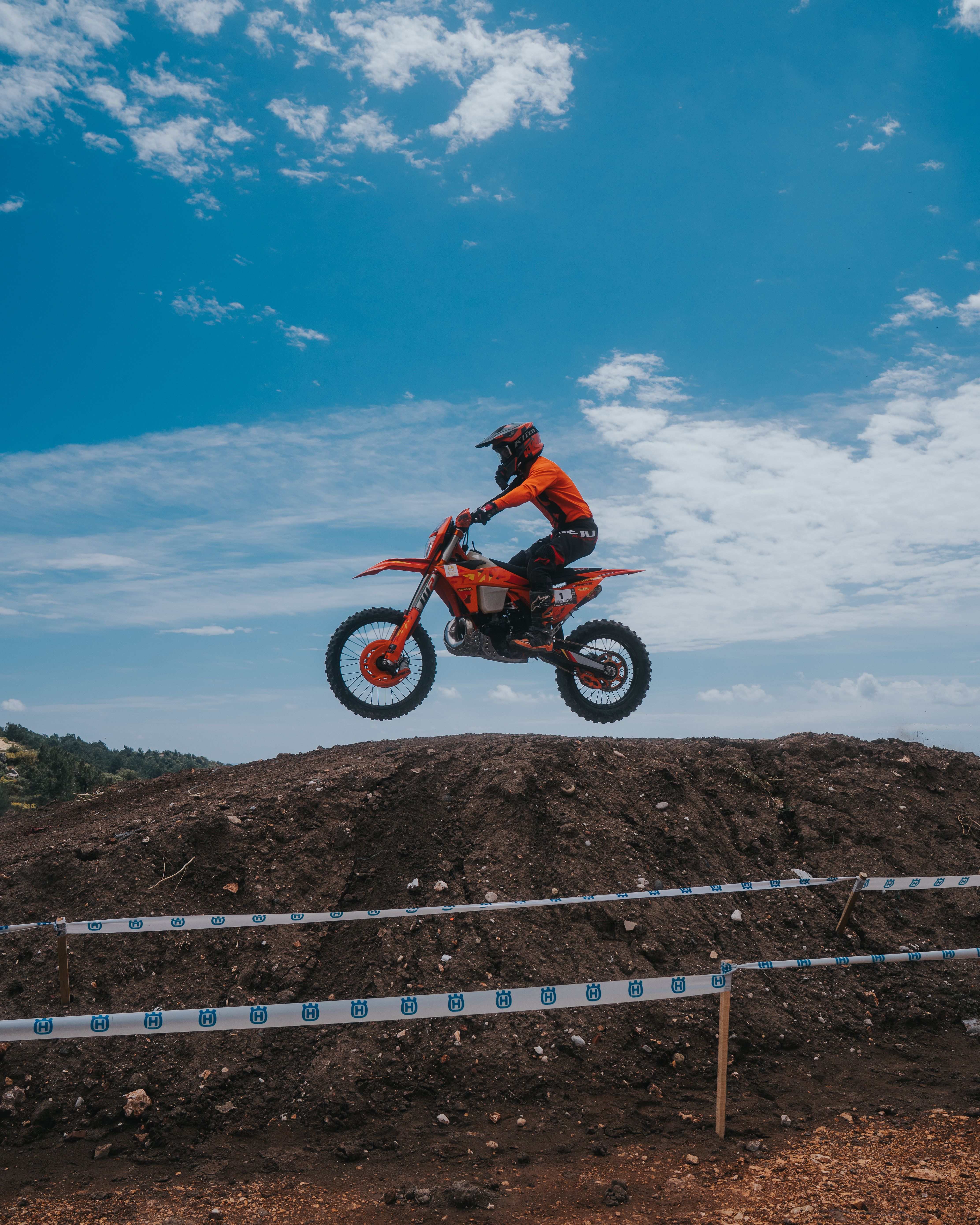 Off-road Motocross Jump Under Blue Sky · Free Stock Photo