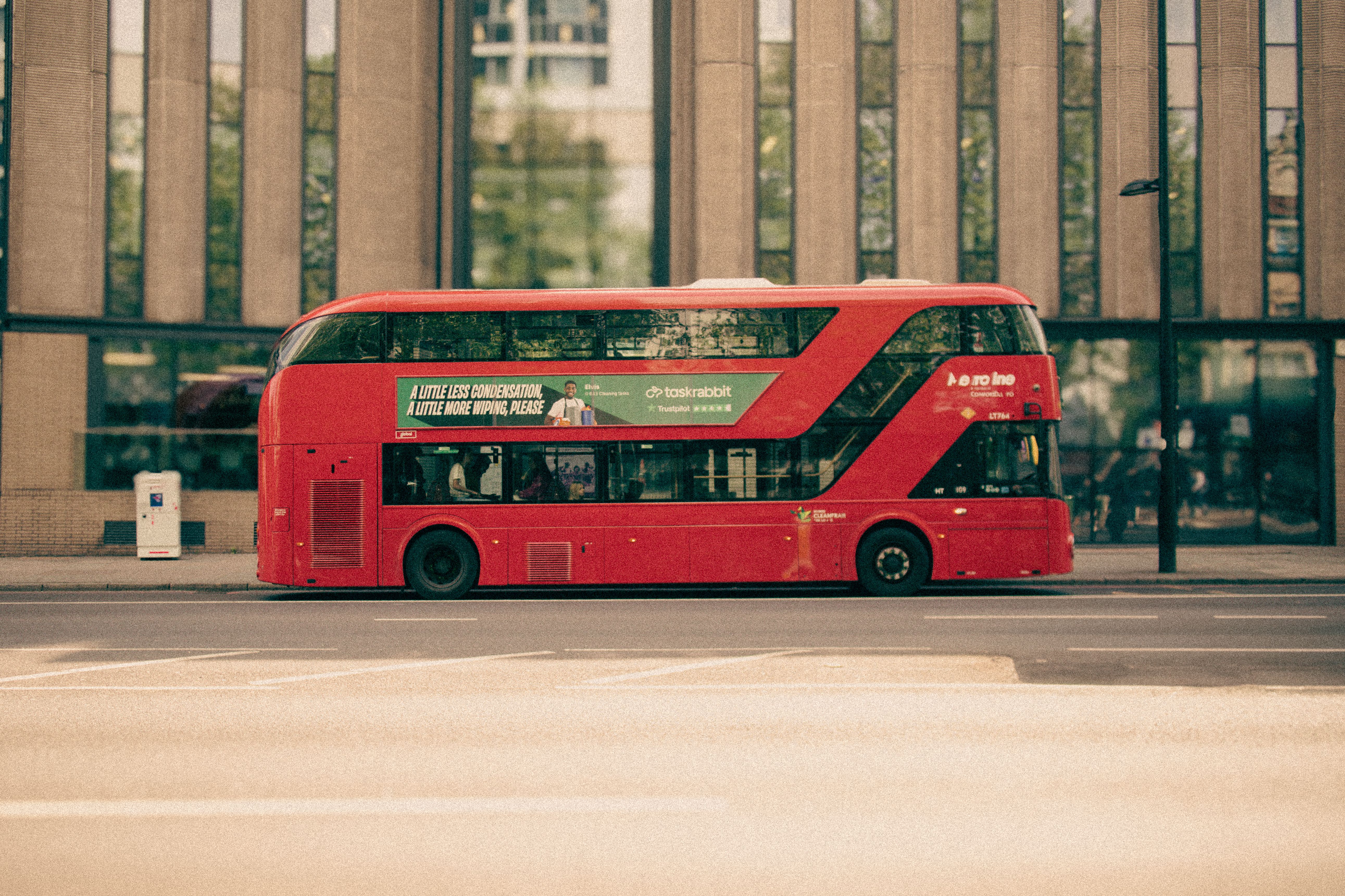 Iconic London Double-Decker Bus on City Street · Free Stock Photo