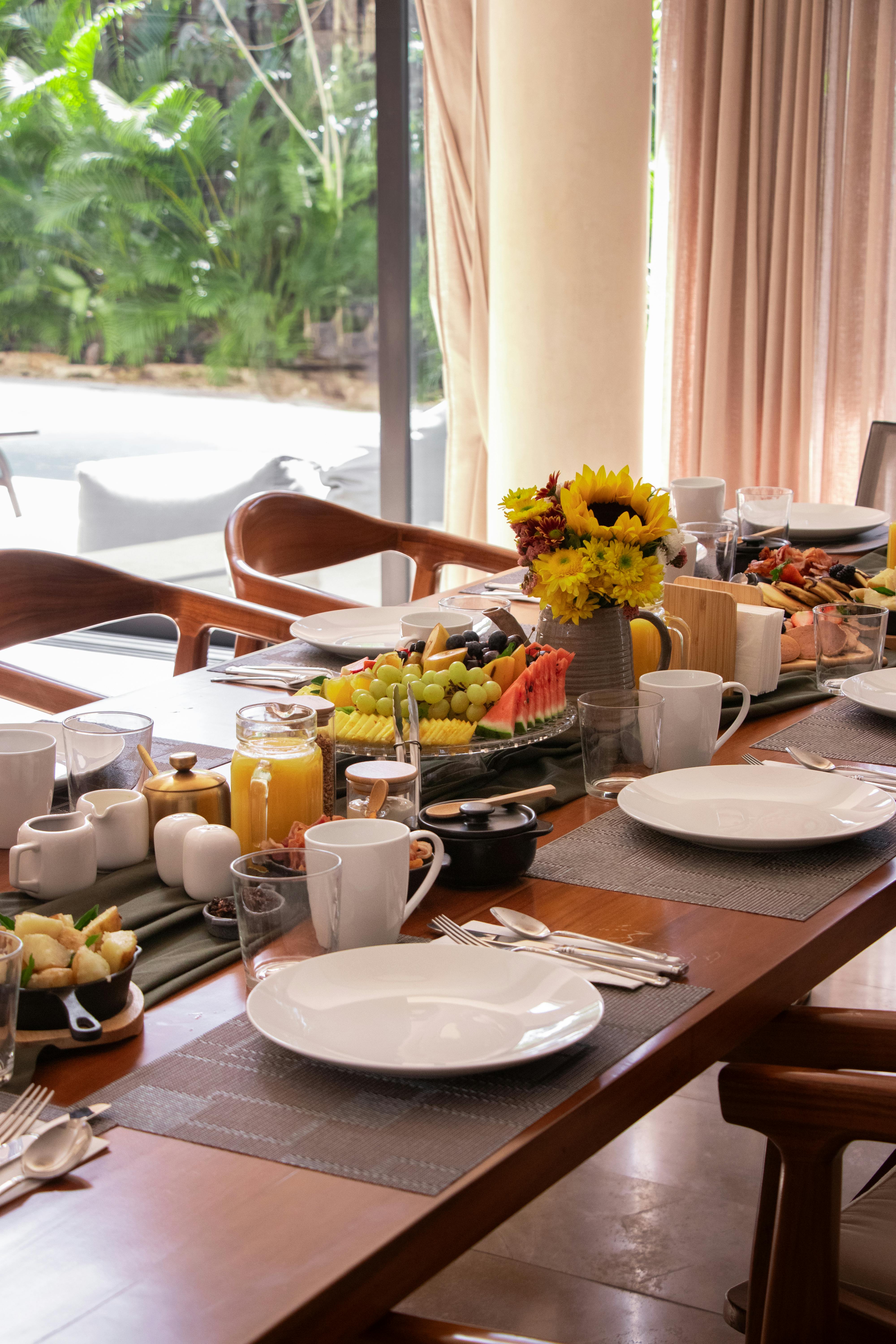 Elegant Breakfast Table with Sunflower Centerpiece · Free Stock Photo