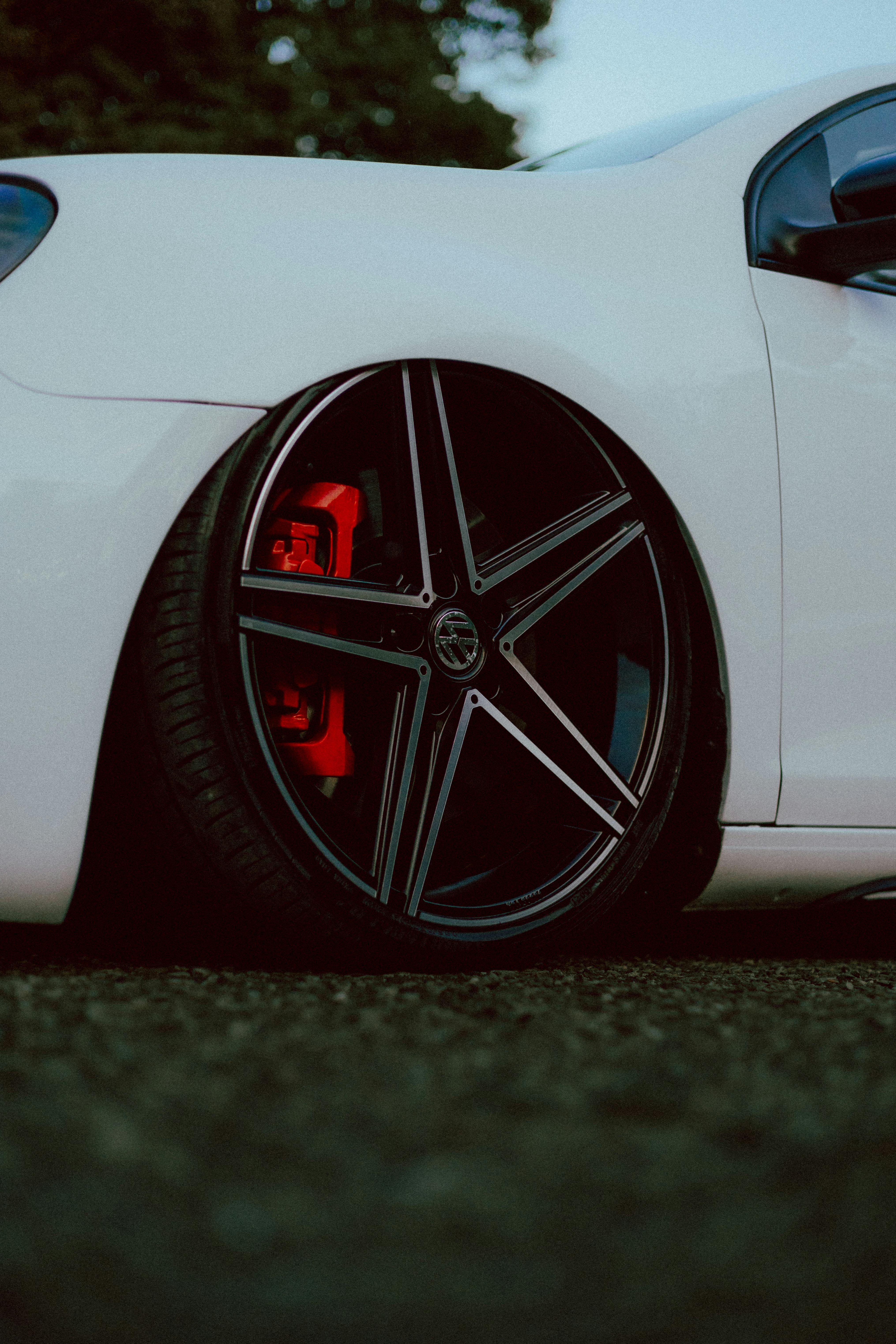 Close-up of a Modified Car Wheel with Custom Rims · Free Stock Photo
