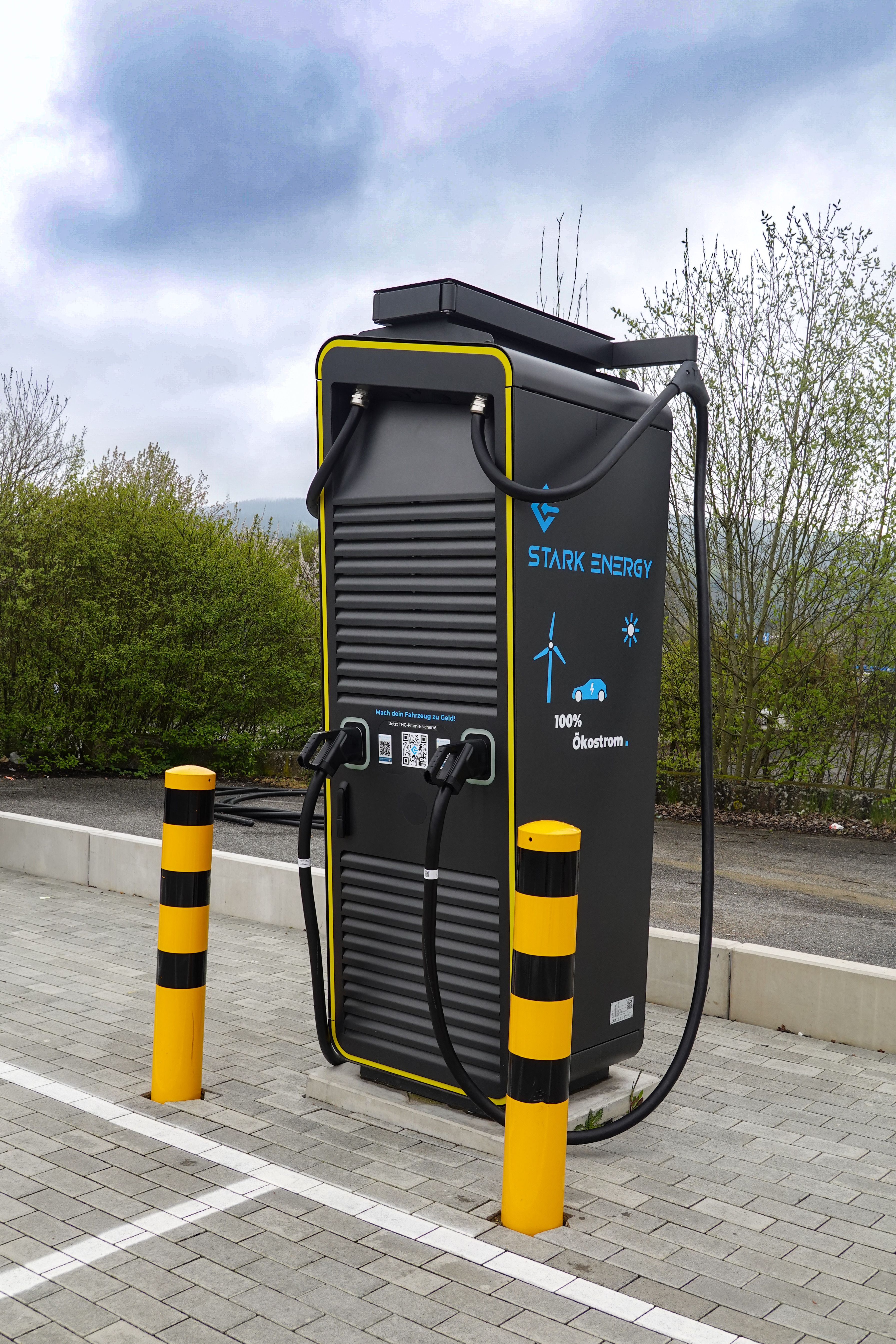 Modern Electric Vehicle Charging Station Outdoors · Free Stock Photo