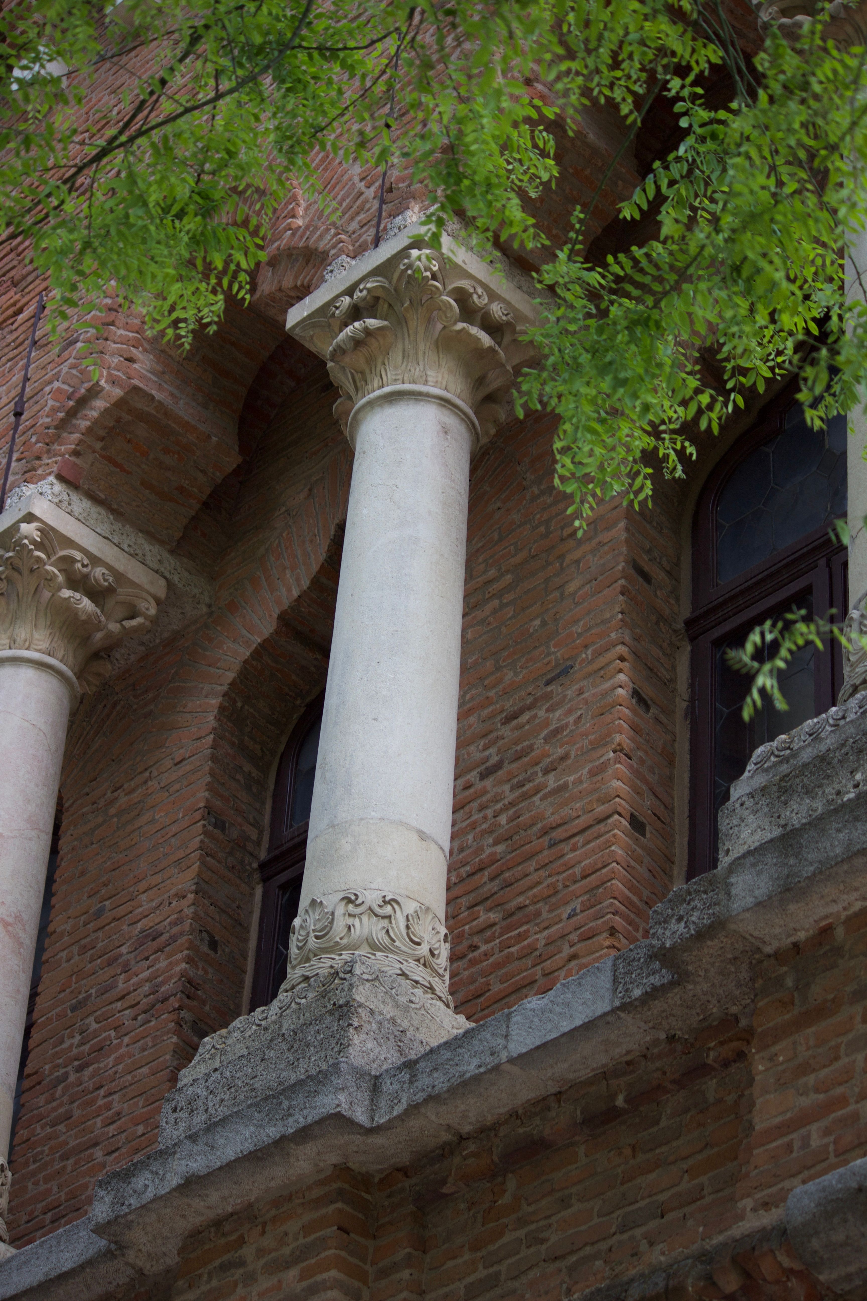 Historic Brick and Column Architecture with Green Foliage · Free Stock ...