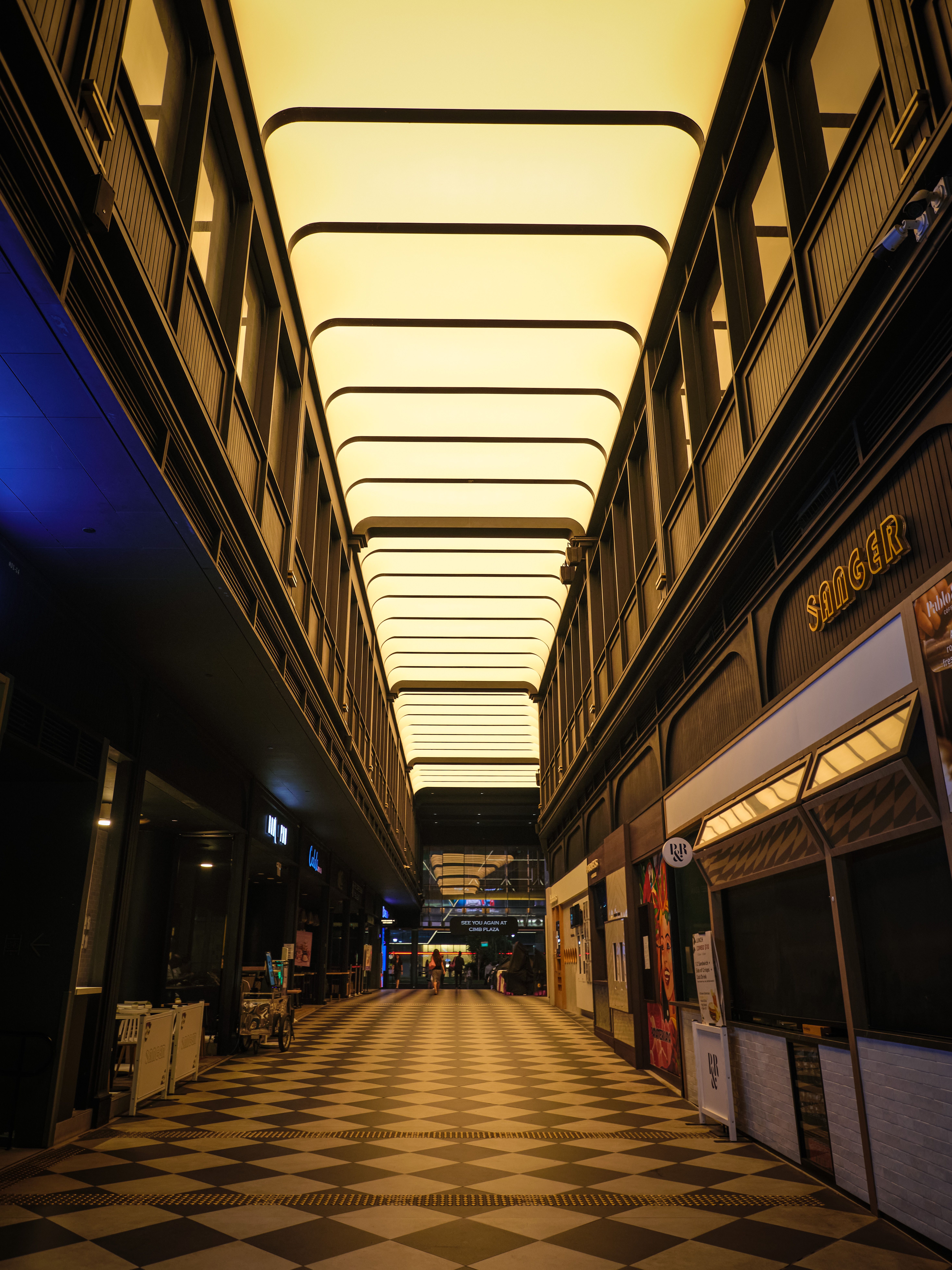 Modern Shopping Arcade with Illuminated Ceiling · Free Stock Photo