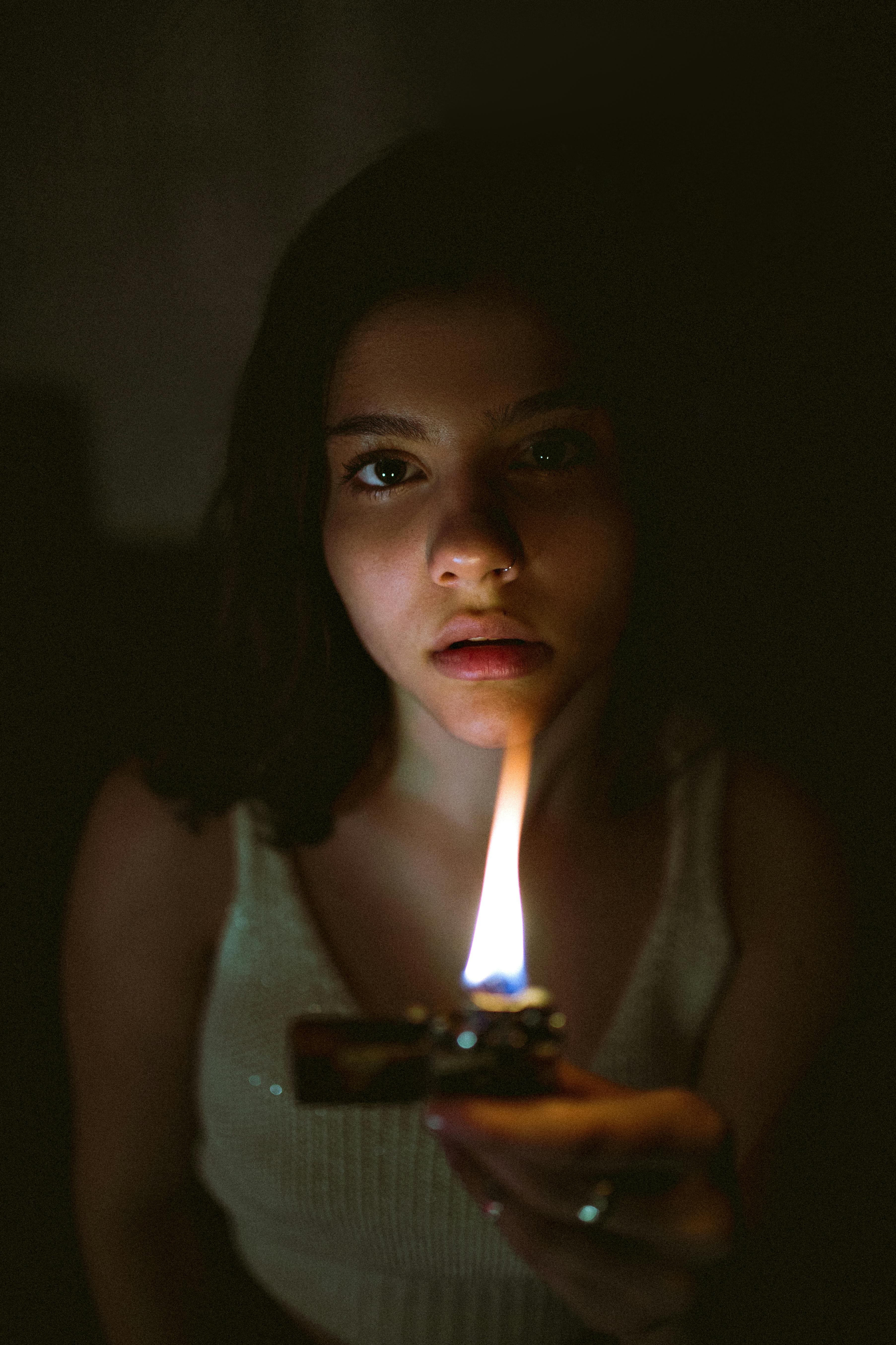 Woman Holding Flip Lighter · Free Stock Photo Woman Holding Flip Lighter · Free Stock Photo