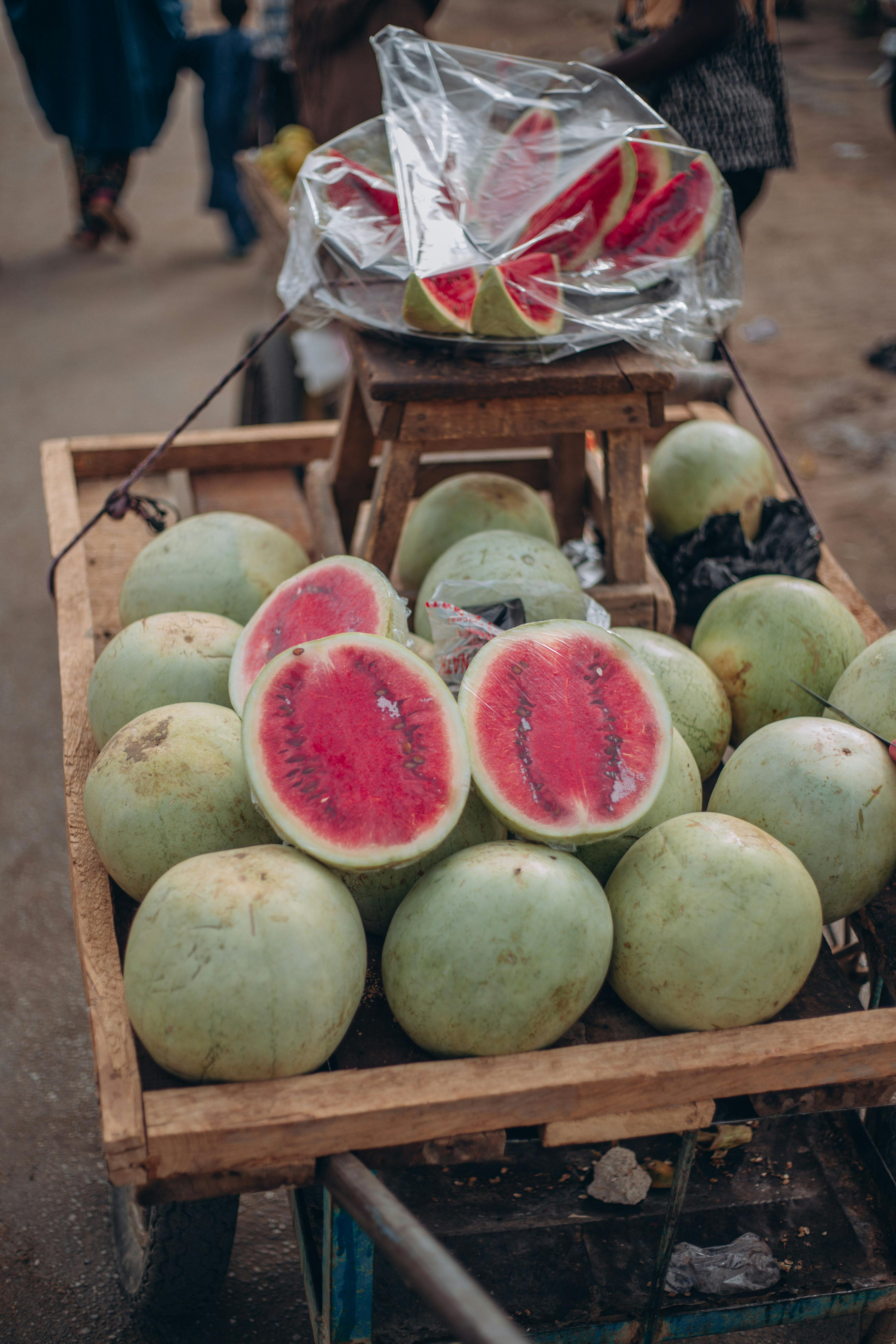 Vibrant Watermelons on Market Cart Outdoors · Free Stock Photo