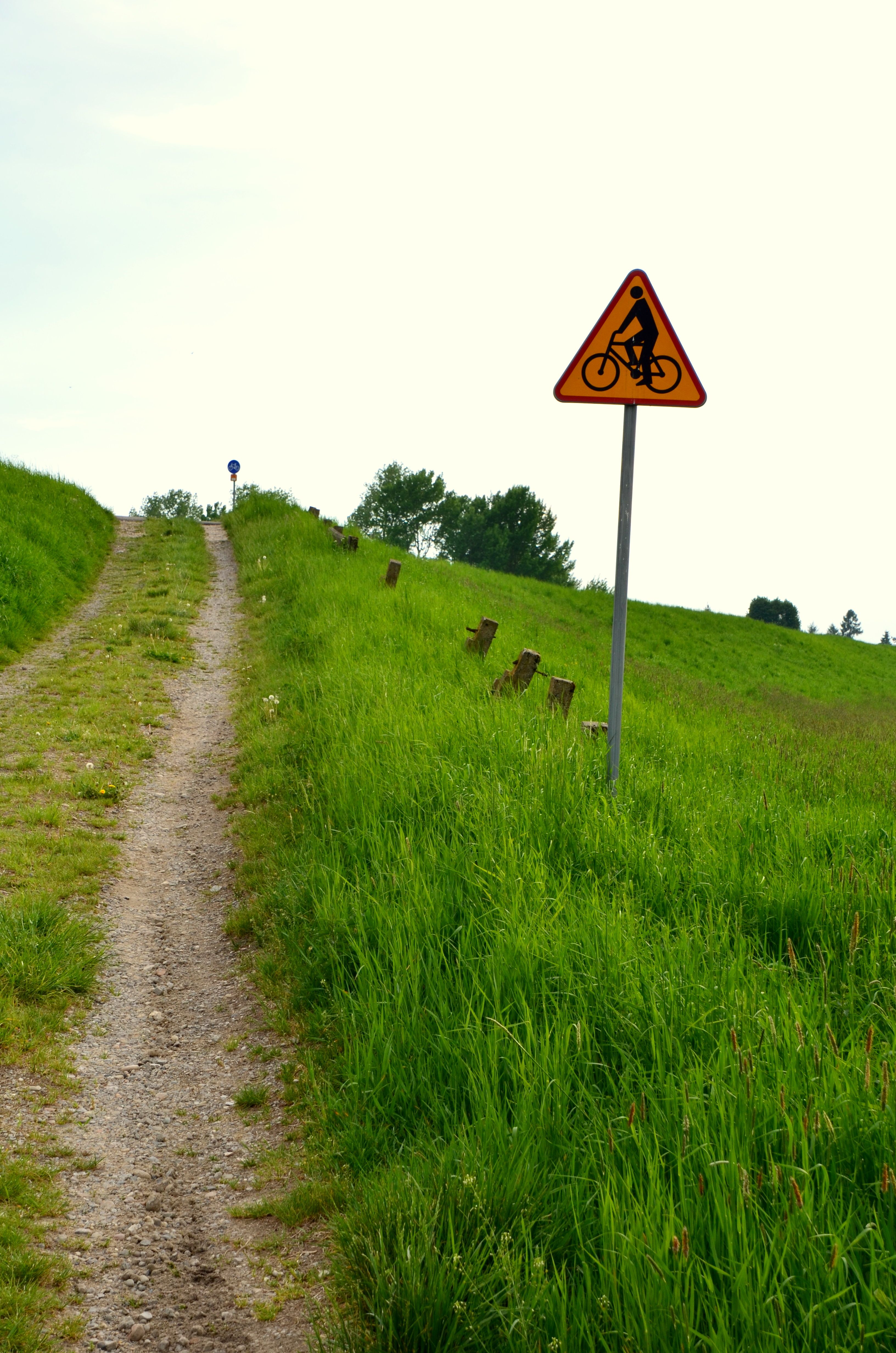 Countryside Path with Bicycle Warning Sign · Free Stock Photo
