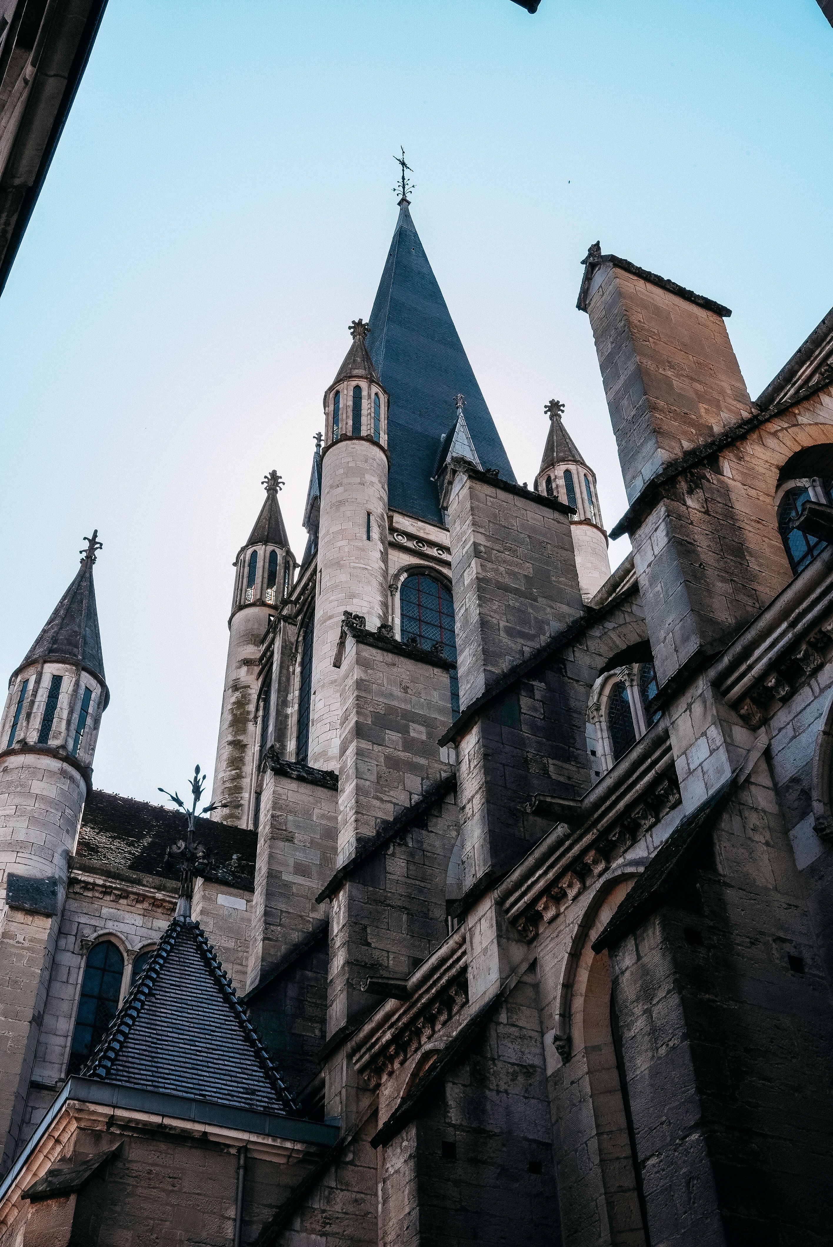 Majestic Gothic Cathedral Spires Against Clear Sky · Free Stock Photo