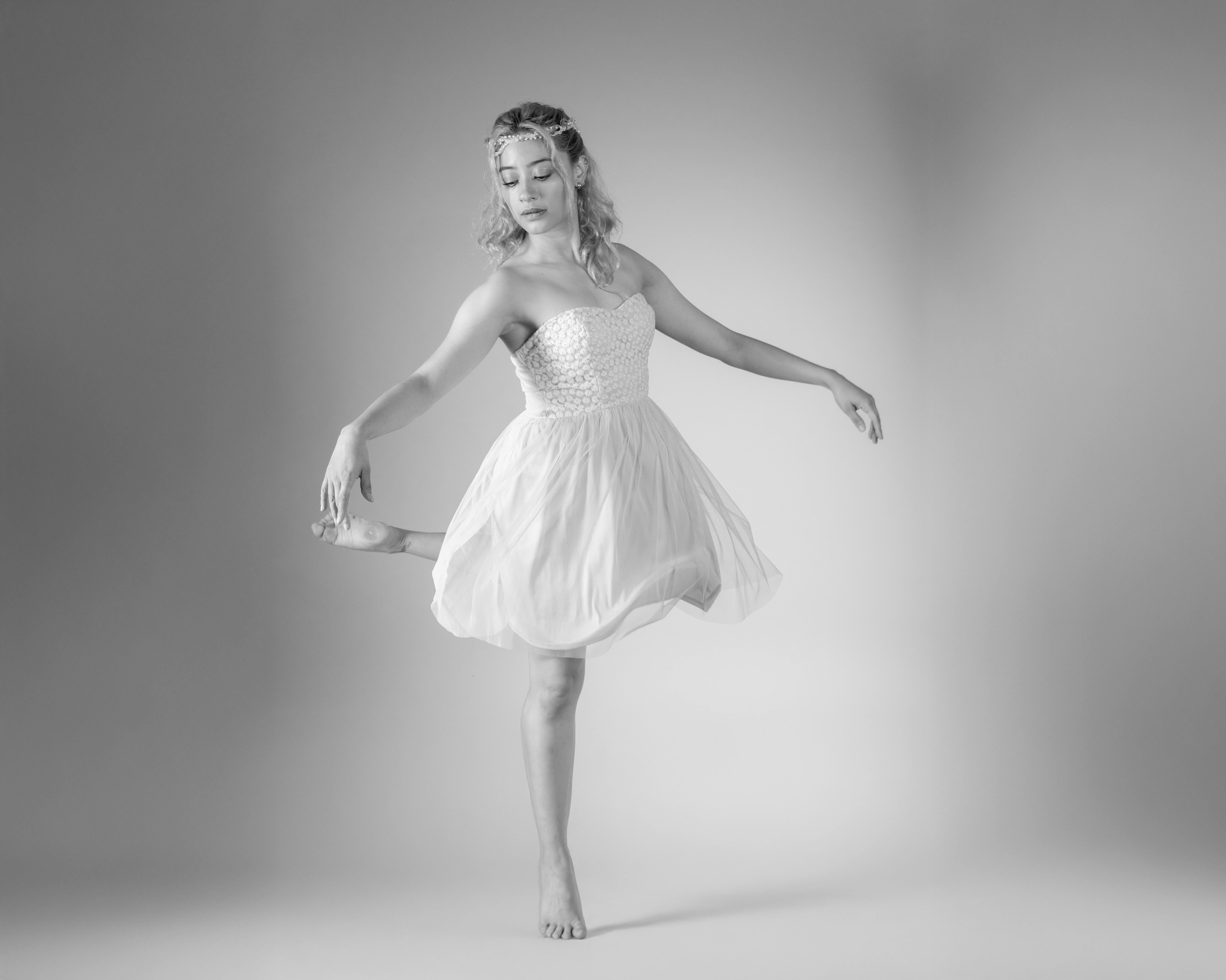 Elegant Ballet Dancer in Graceful Pose · Free Stock Photo