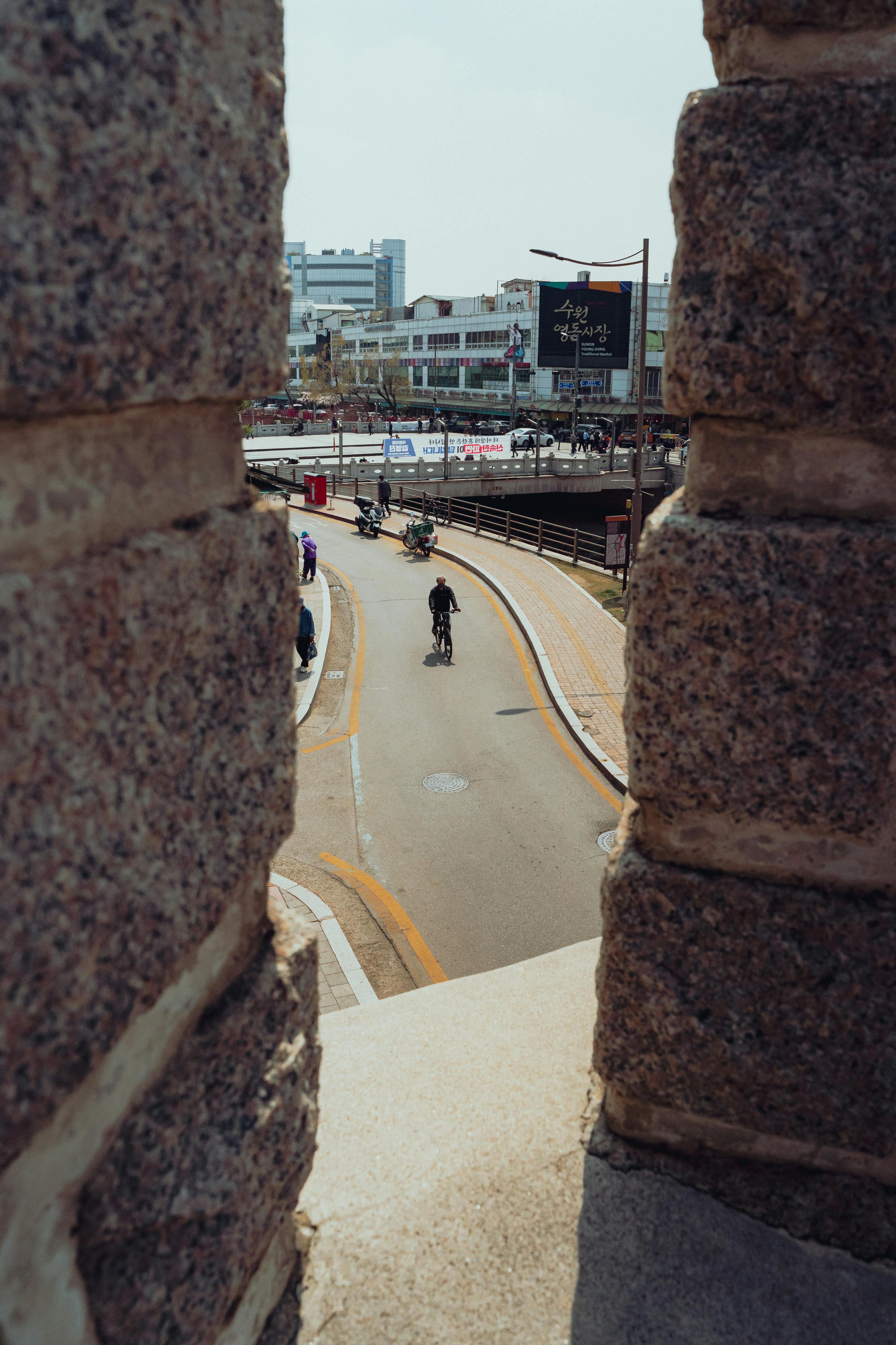 Cyclists in Historic Seoul Street View · Free Stock Photo