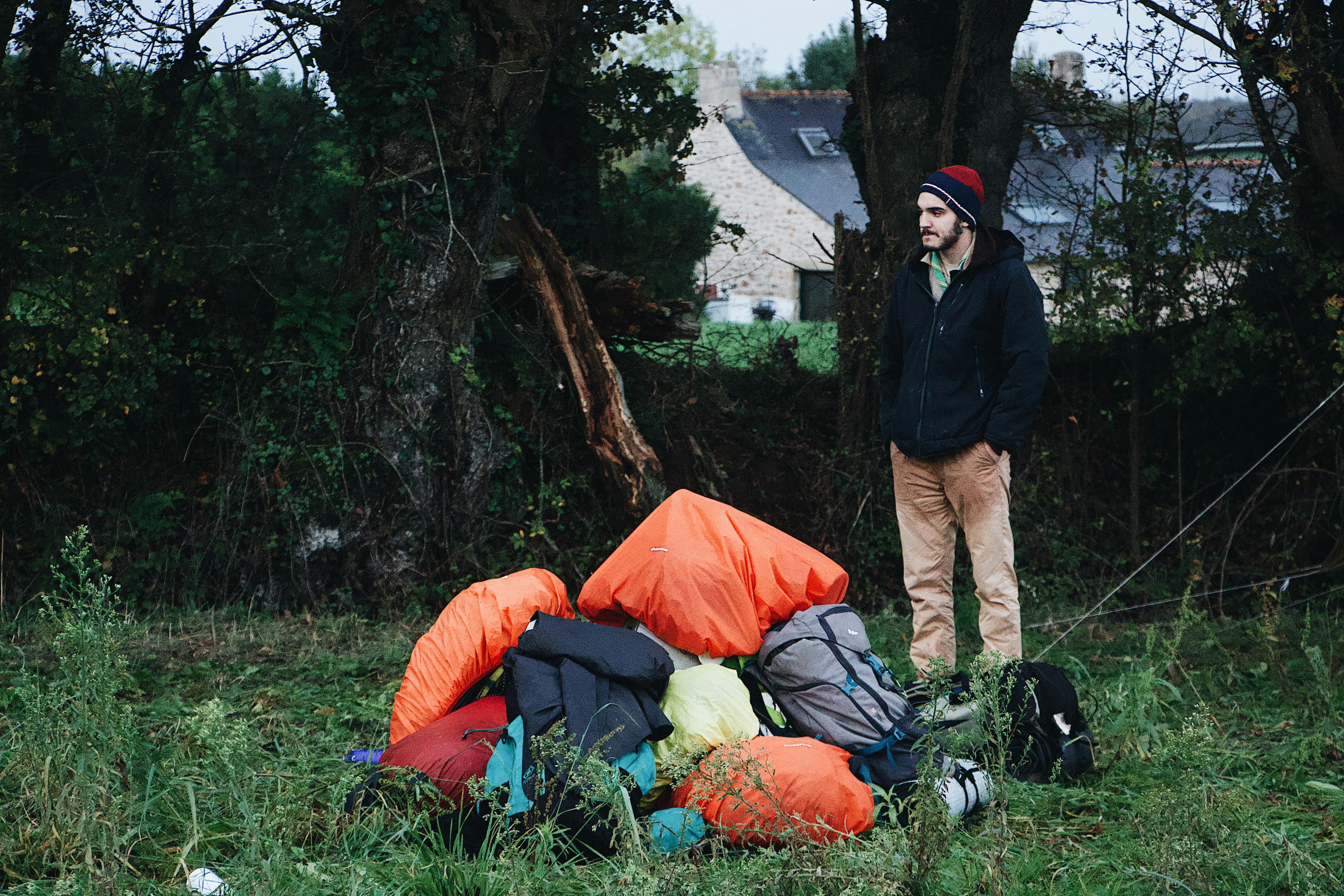 Man Standing Beside Tree · Free Stock Photo