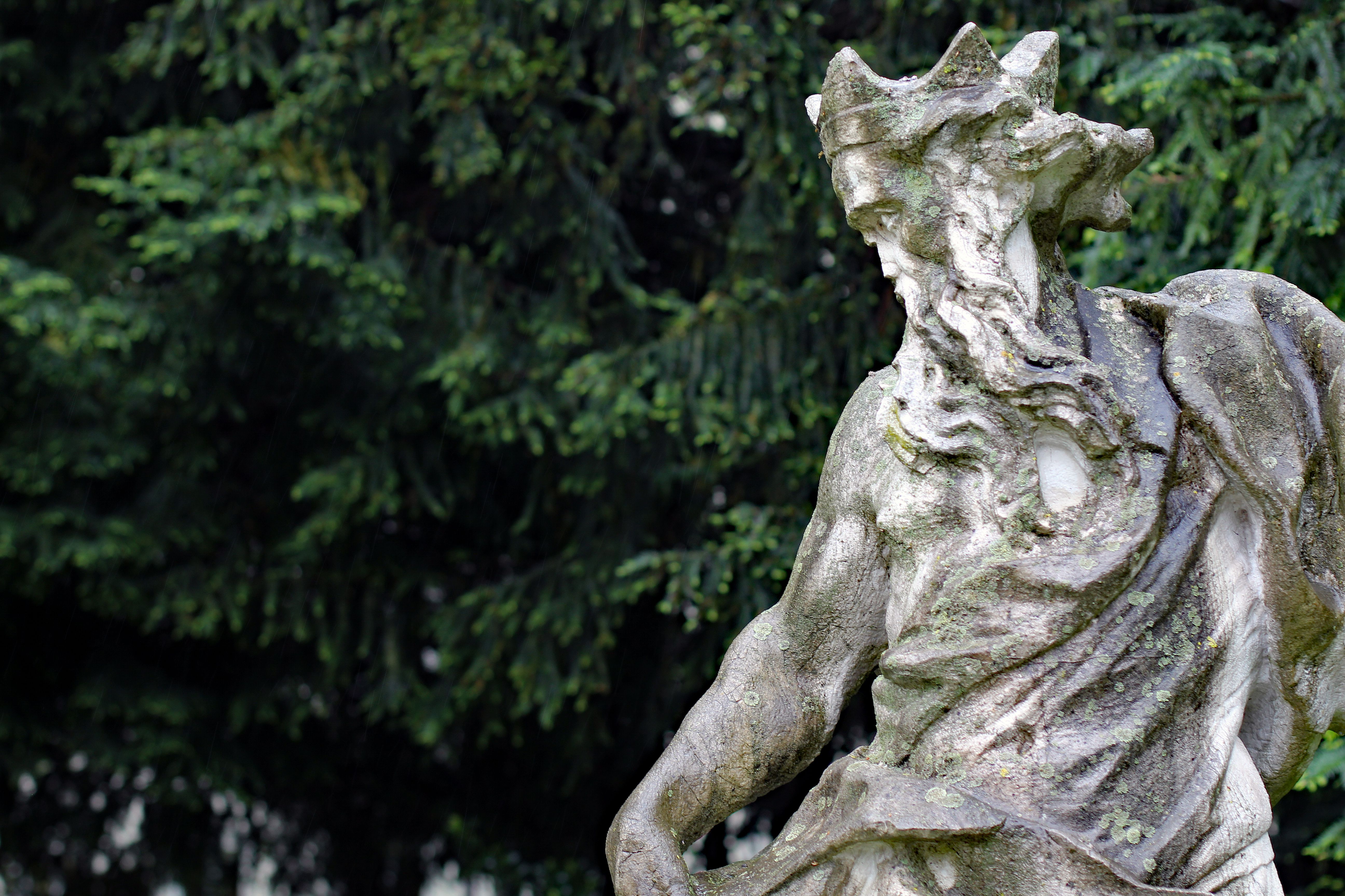 Weathered Stone Sculpture in Augsburg Garden · Free Stock Photo